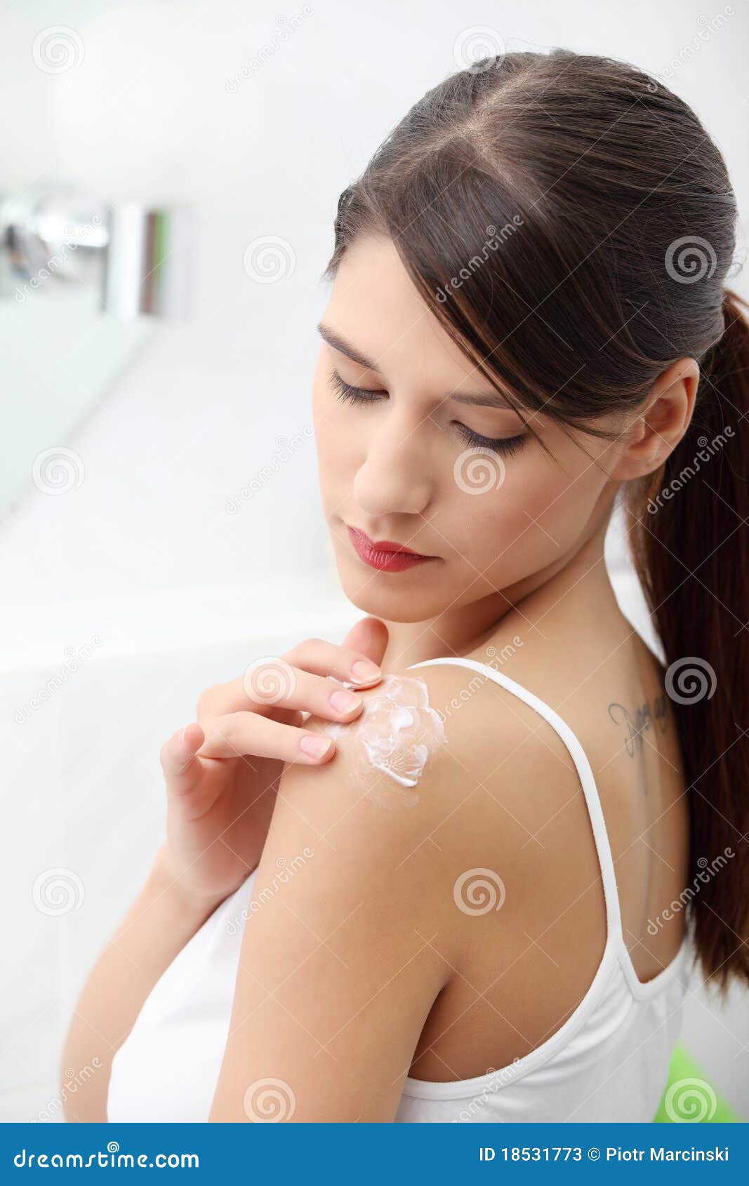Woman Applying Cream on Shoulder. Stock Image - Image of clear, cream ...