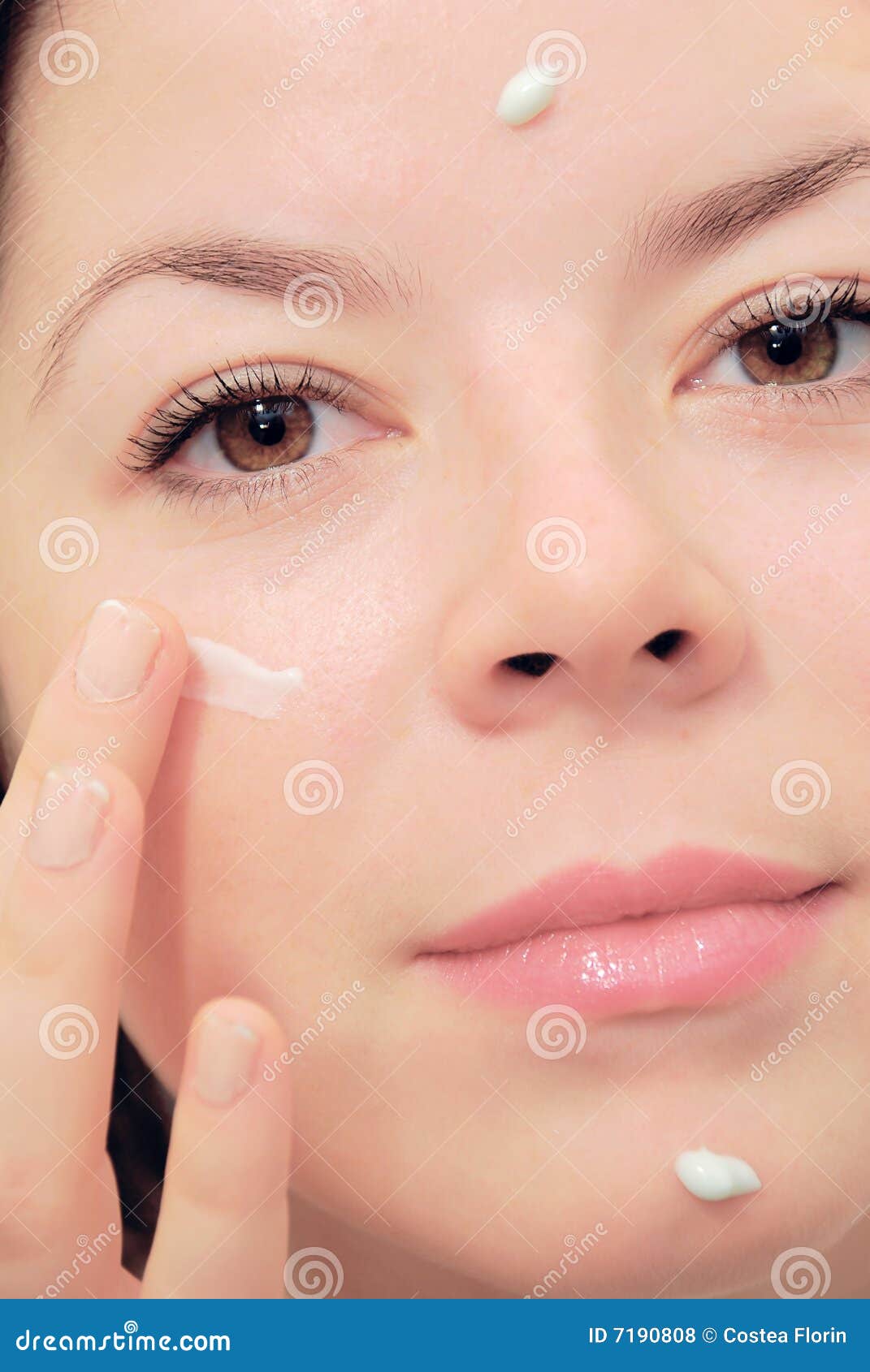 Woman applying creme stock photo. Image of face, health - 7190808