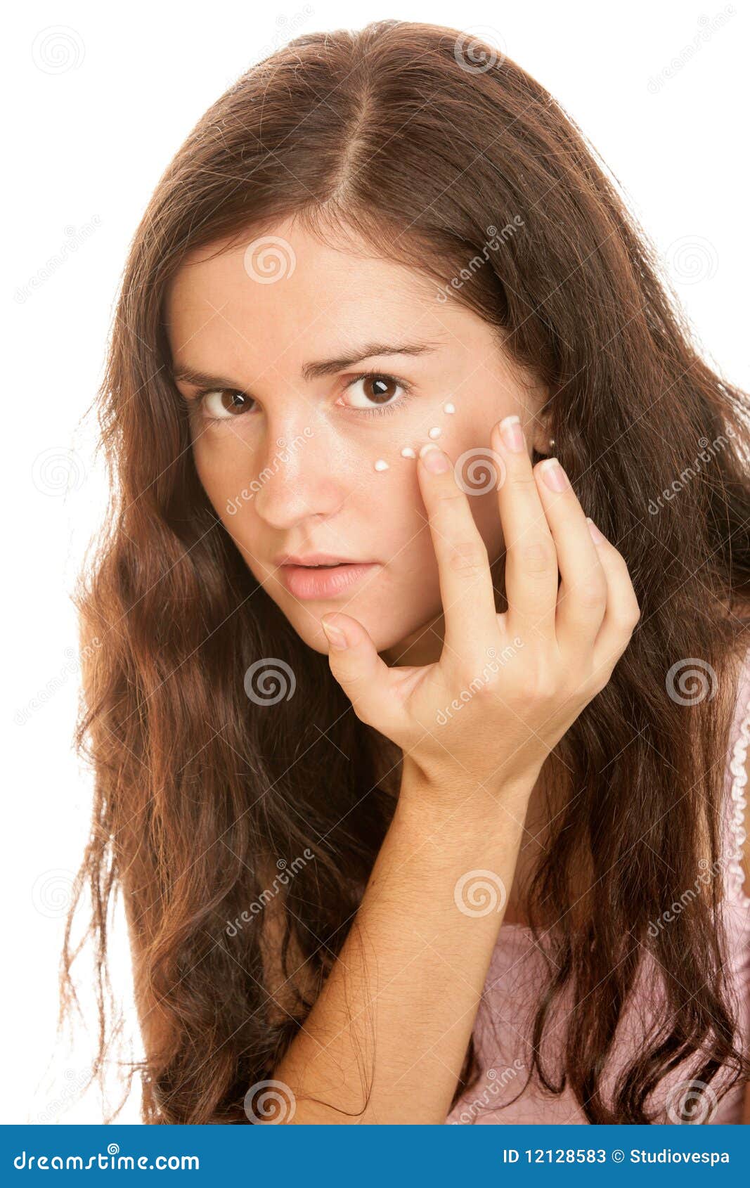 Woman applying eye cream stock image. Image of caucasian - 12128583