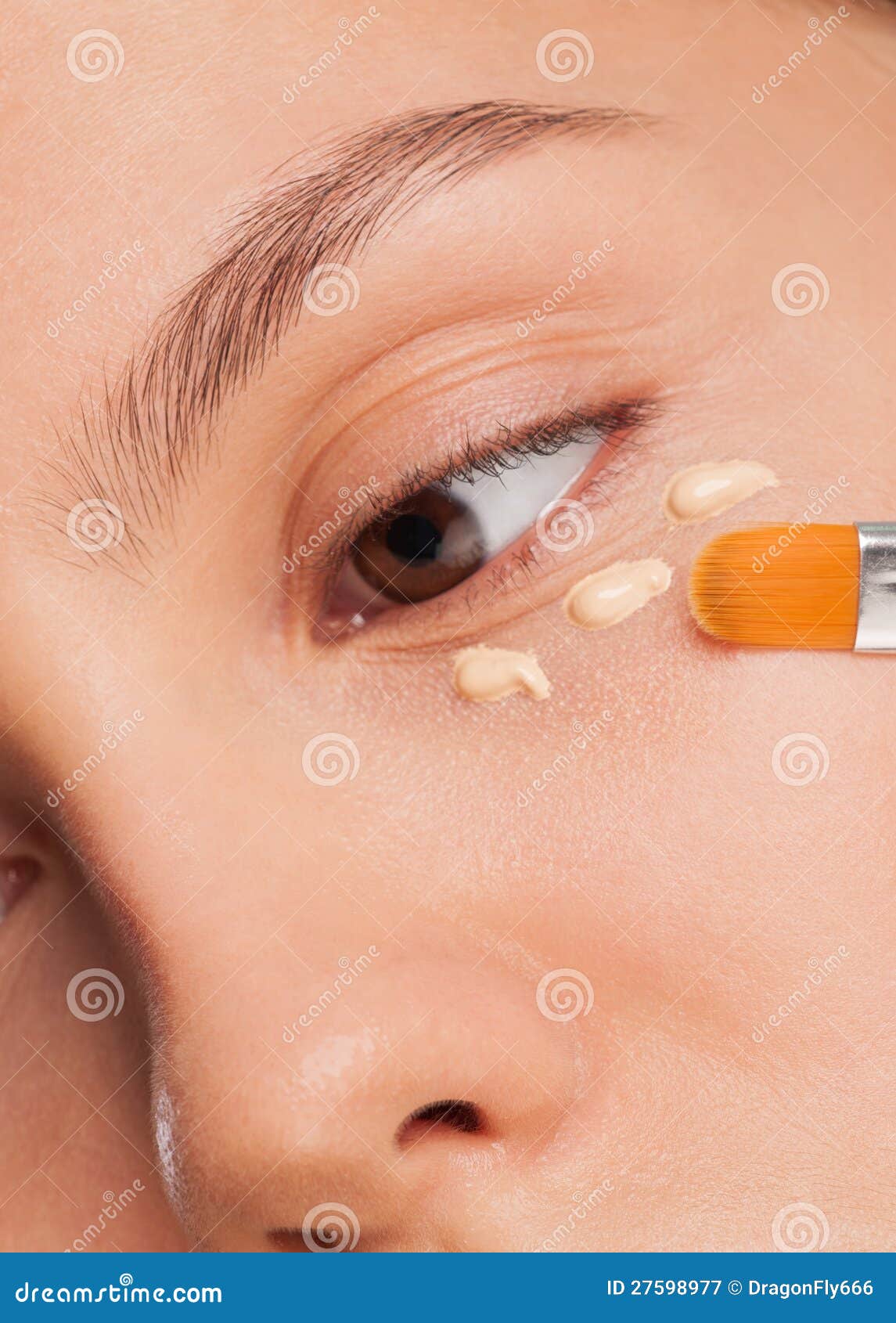 Woman applying foundation stock image. Image of face - 27598977