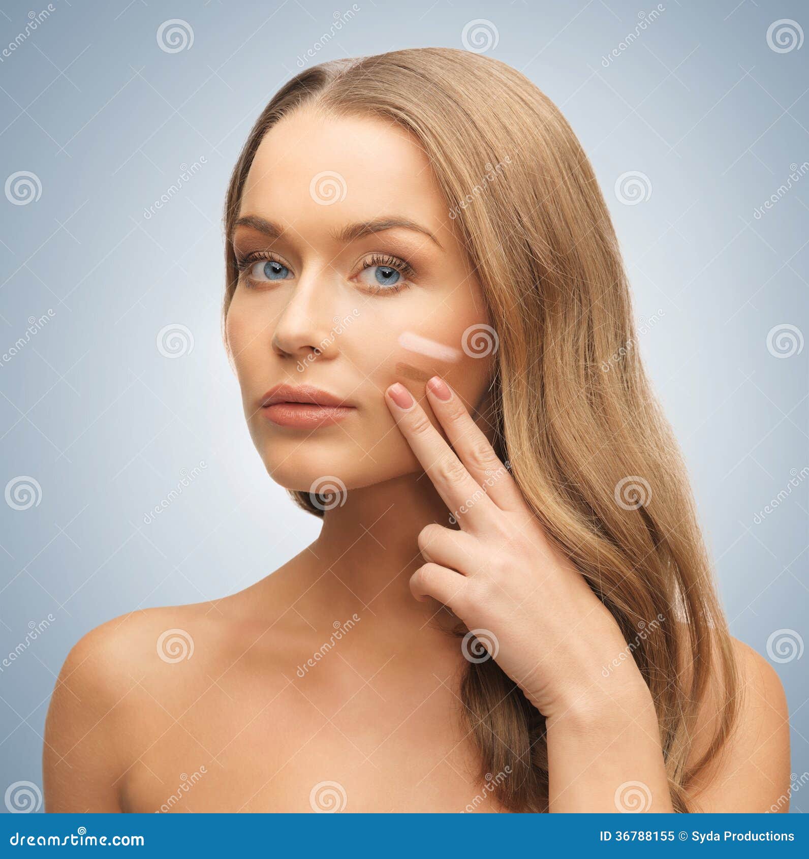 Woman applying foundation stock image. Image of lovely - 36788155