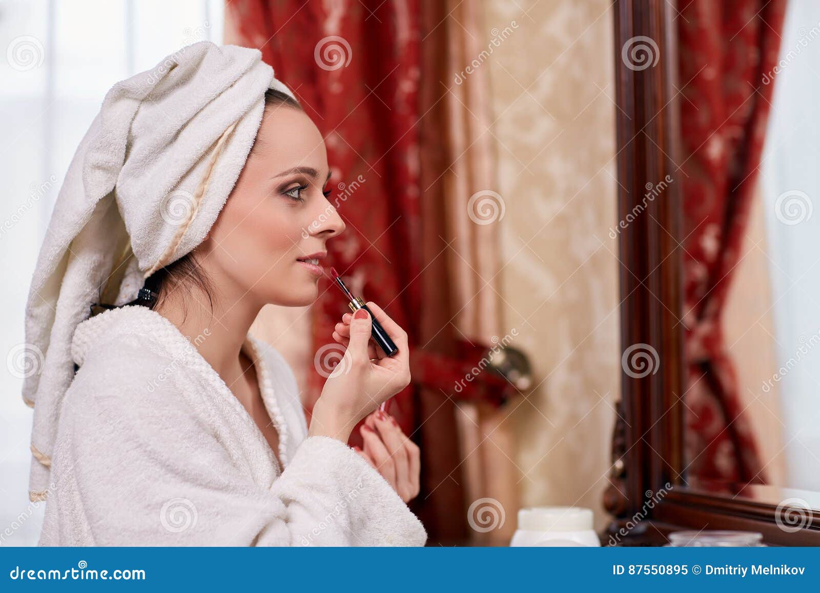 Woman Applying Gloss for Lips. Stock Image - Image of dressing ...