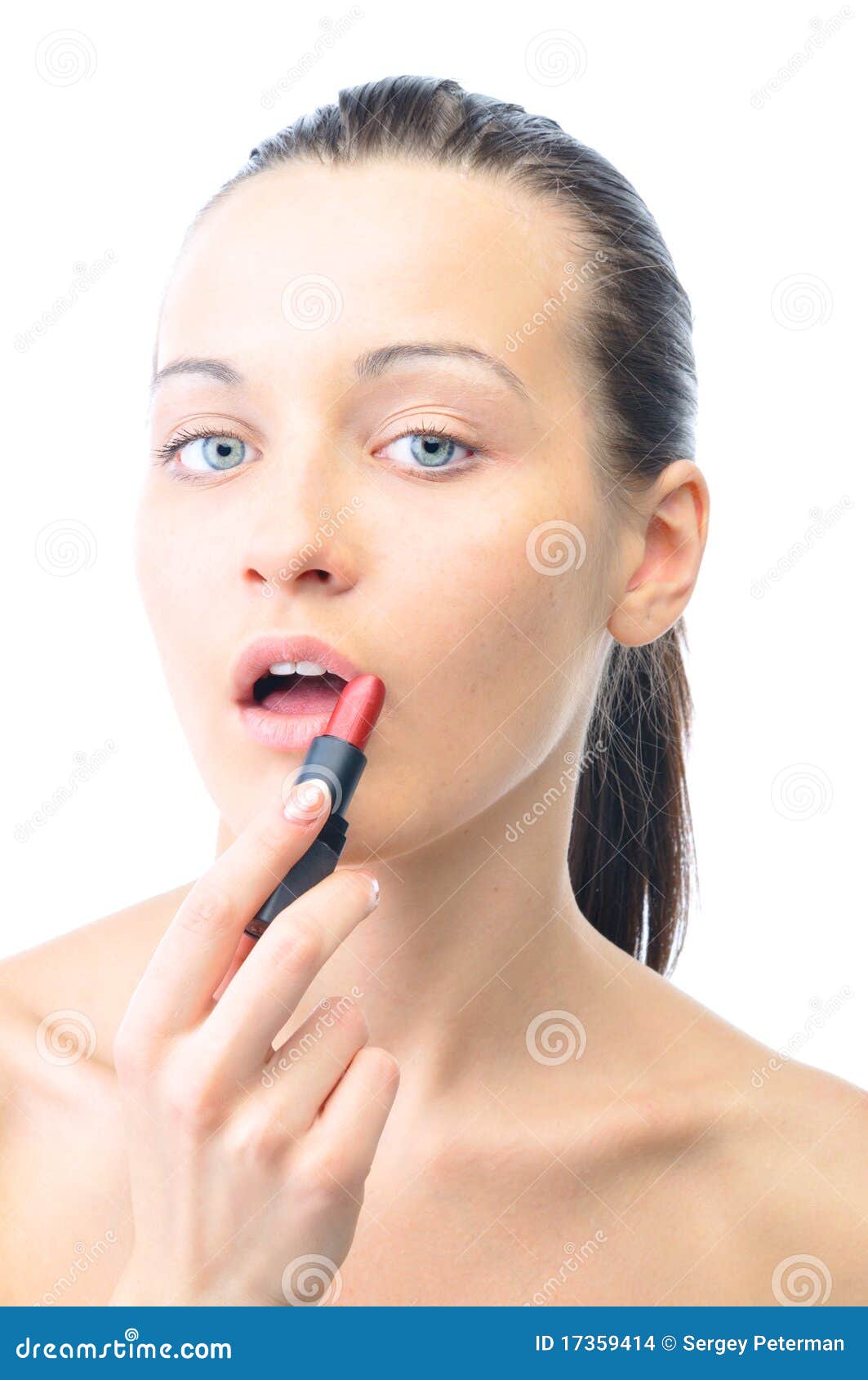 Woman is applying lipstick stock photo. Image of fresh - 17359414