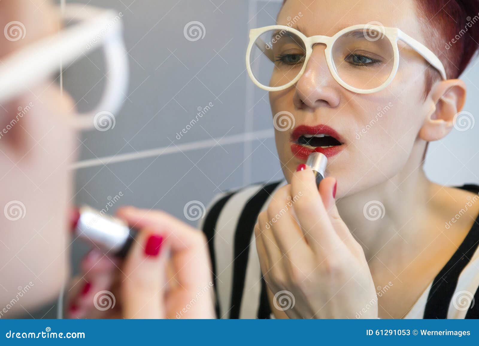 Woman Applying Lipstick On Stock Image Image Of Reflection 61291053