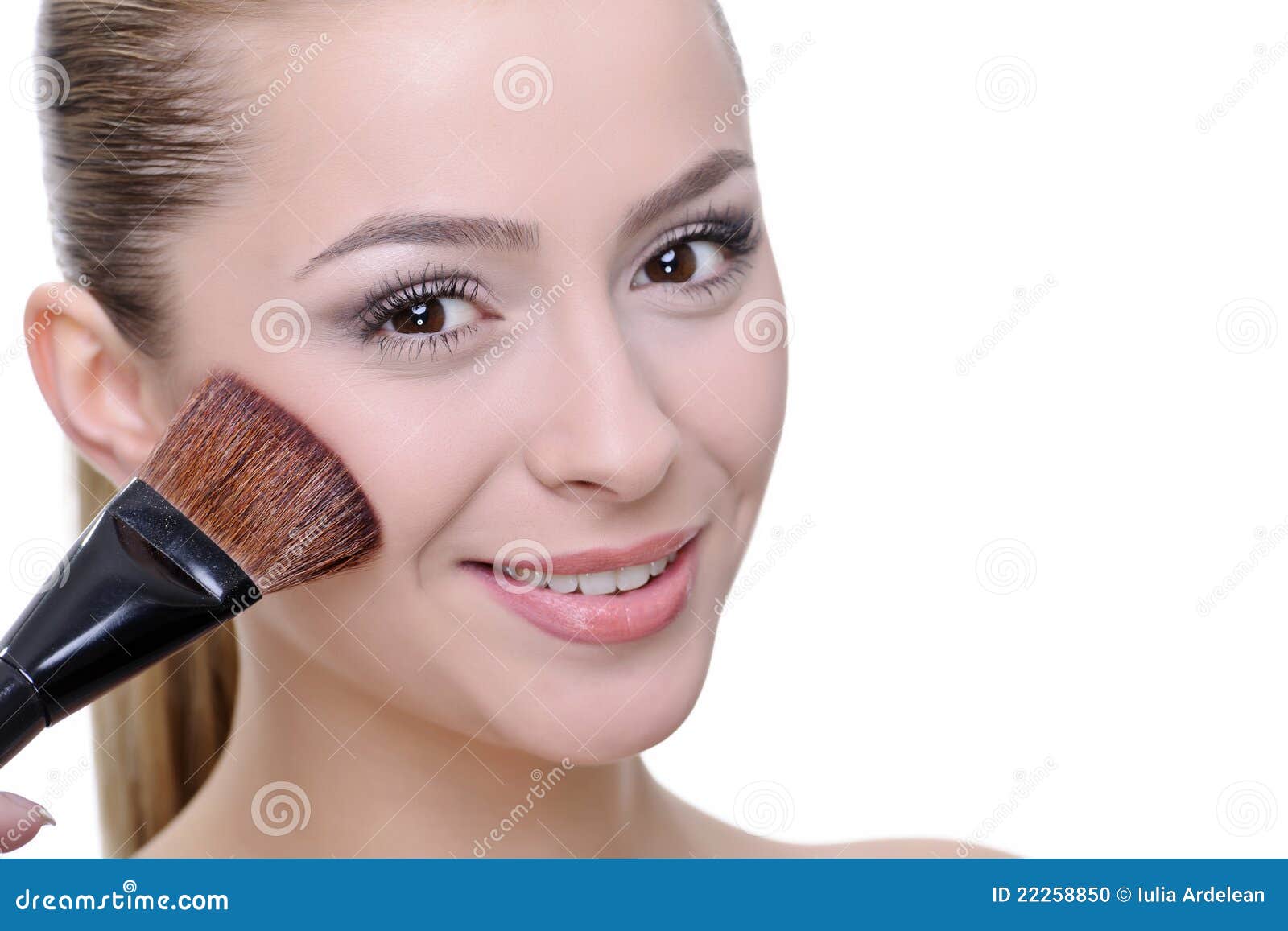 Woman applying make-up stock photo. Image of natural - 22258850