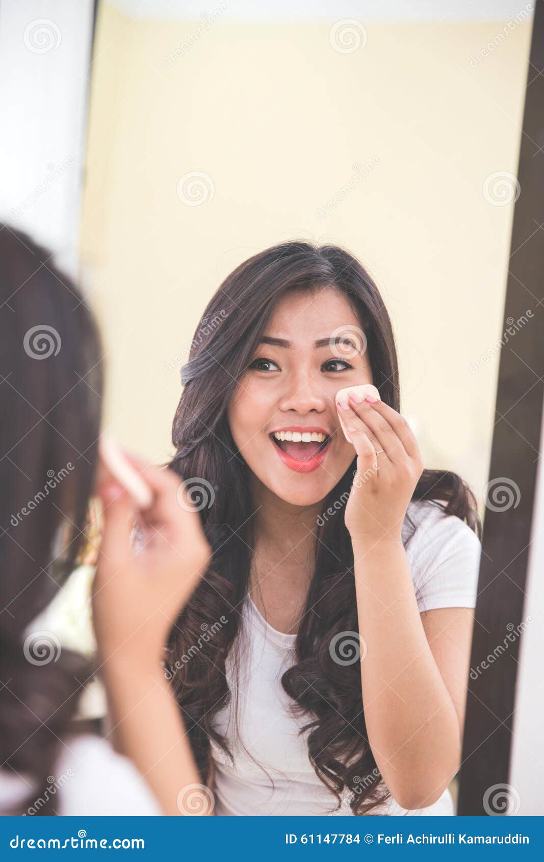 Woman Applying Make Up into Her Face Stock Photo - Image of adult, long ...