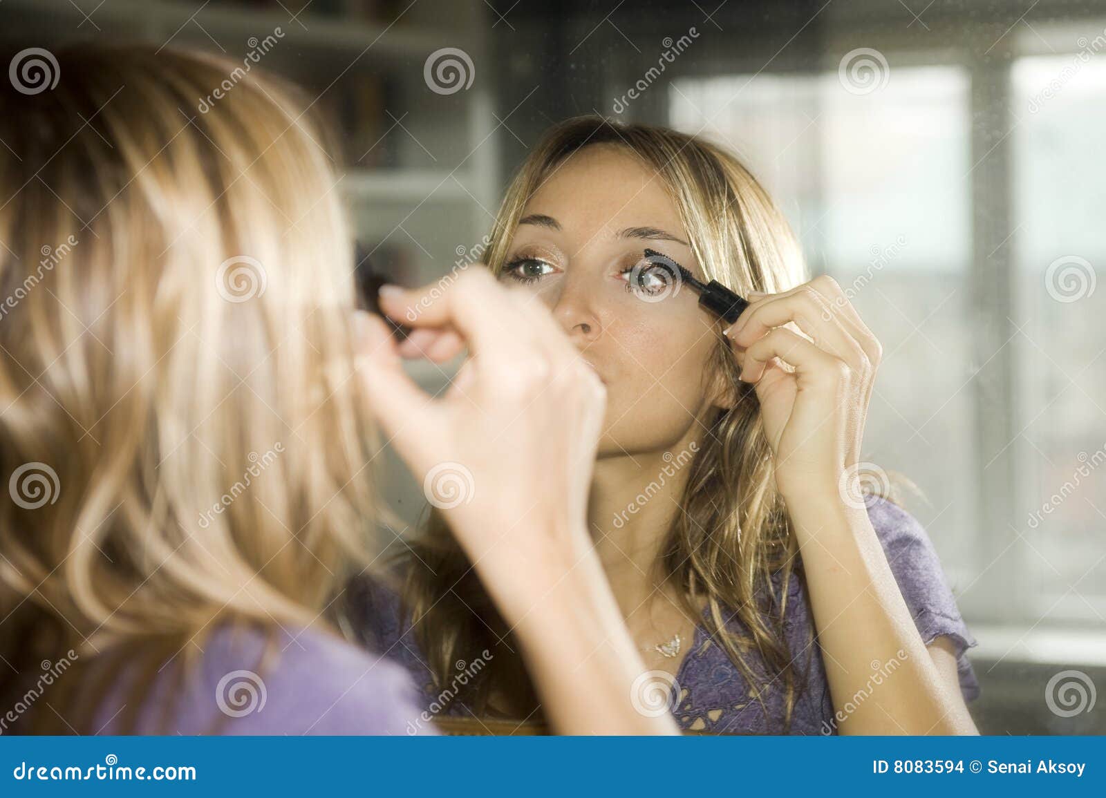 Woman applying makeup stock photo. Image of care, elegance - 8083594
