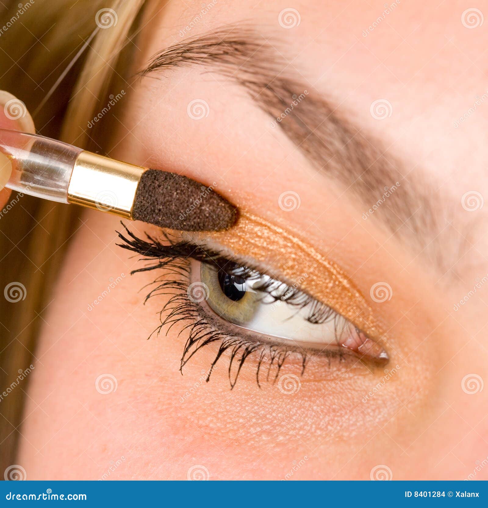 Woman applying makeup stock photo. Image of mirror, face - 8401284