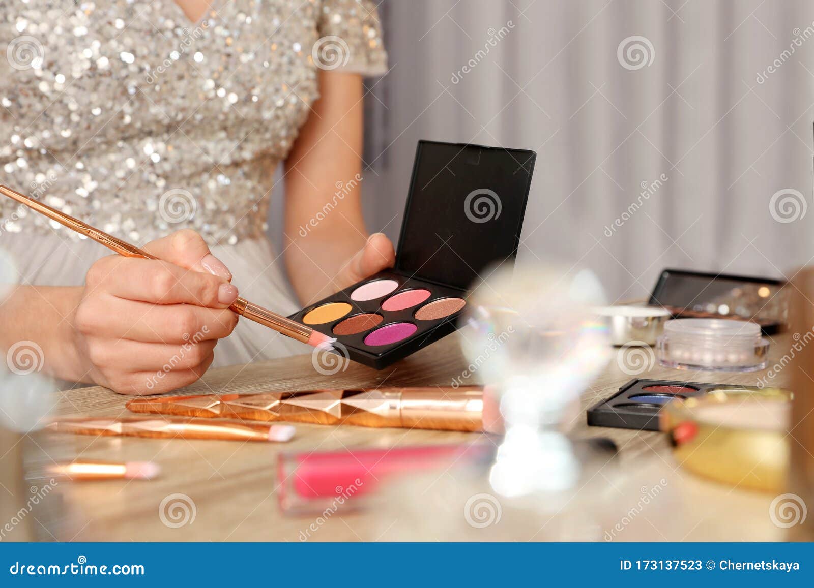 Woman Applying Makeup at Dressing Table Stock Image - Image of beauty ...