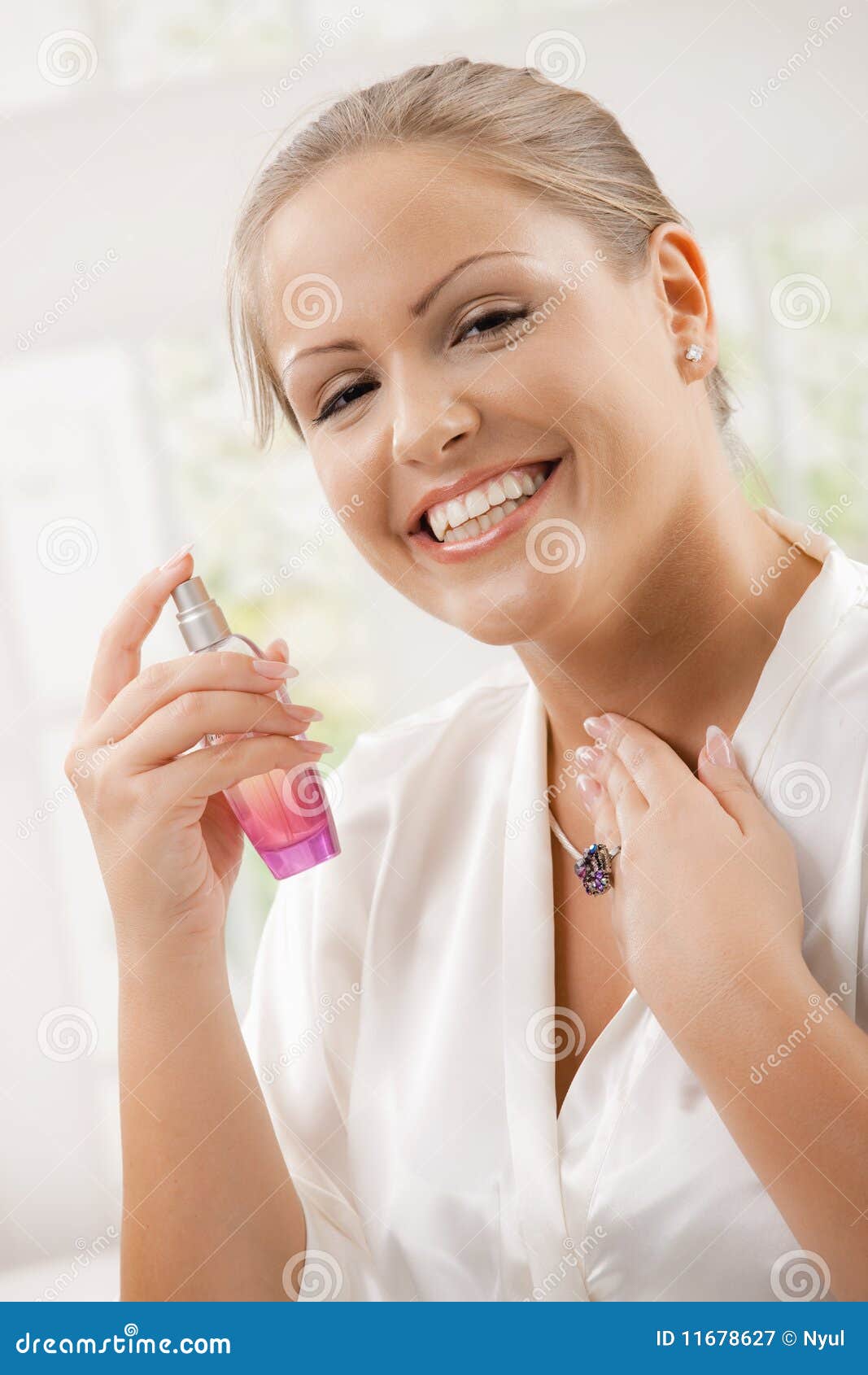 Woman applying perfume stock image. Image of caucasian - 11678627