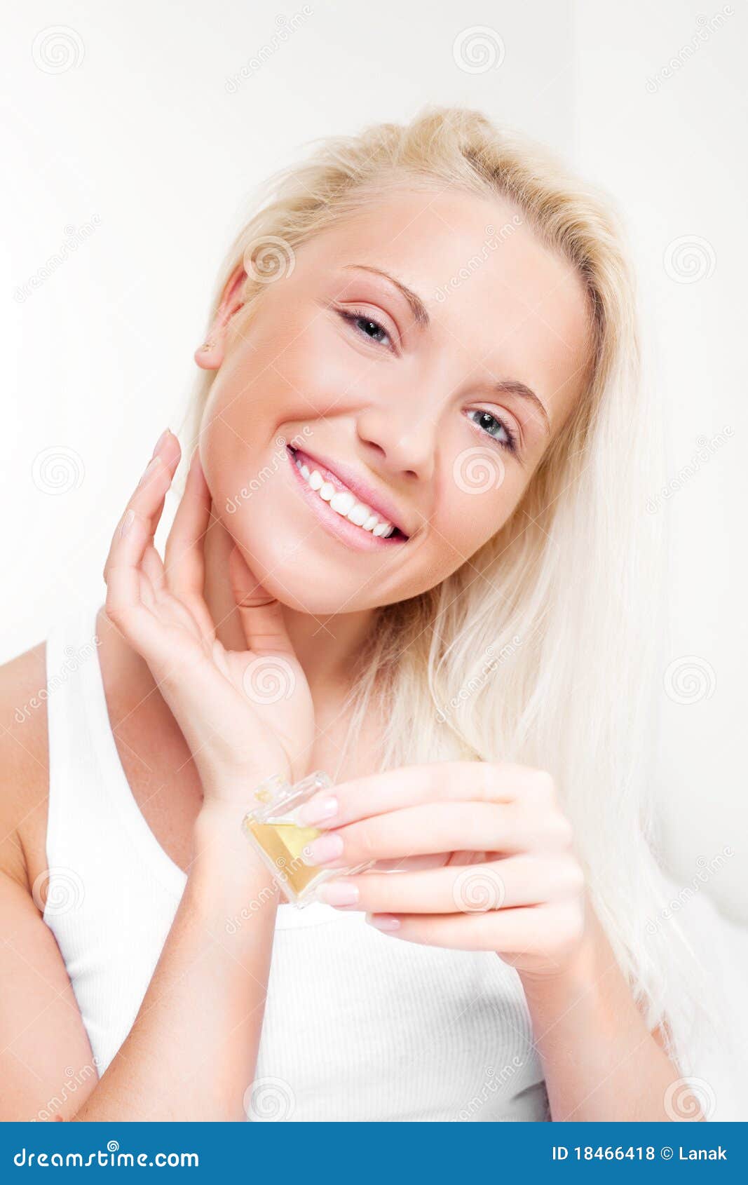 Woman applying perfume stock photo. Image of portrait - 18466418