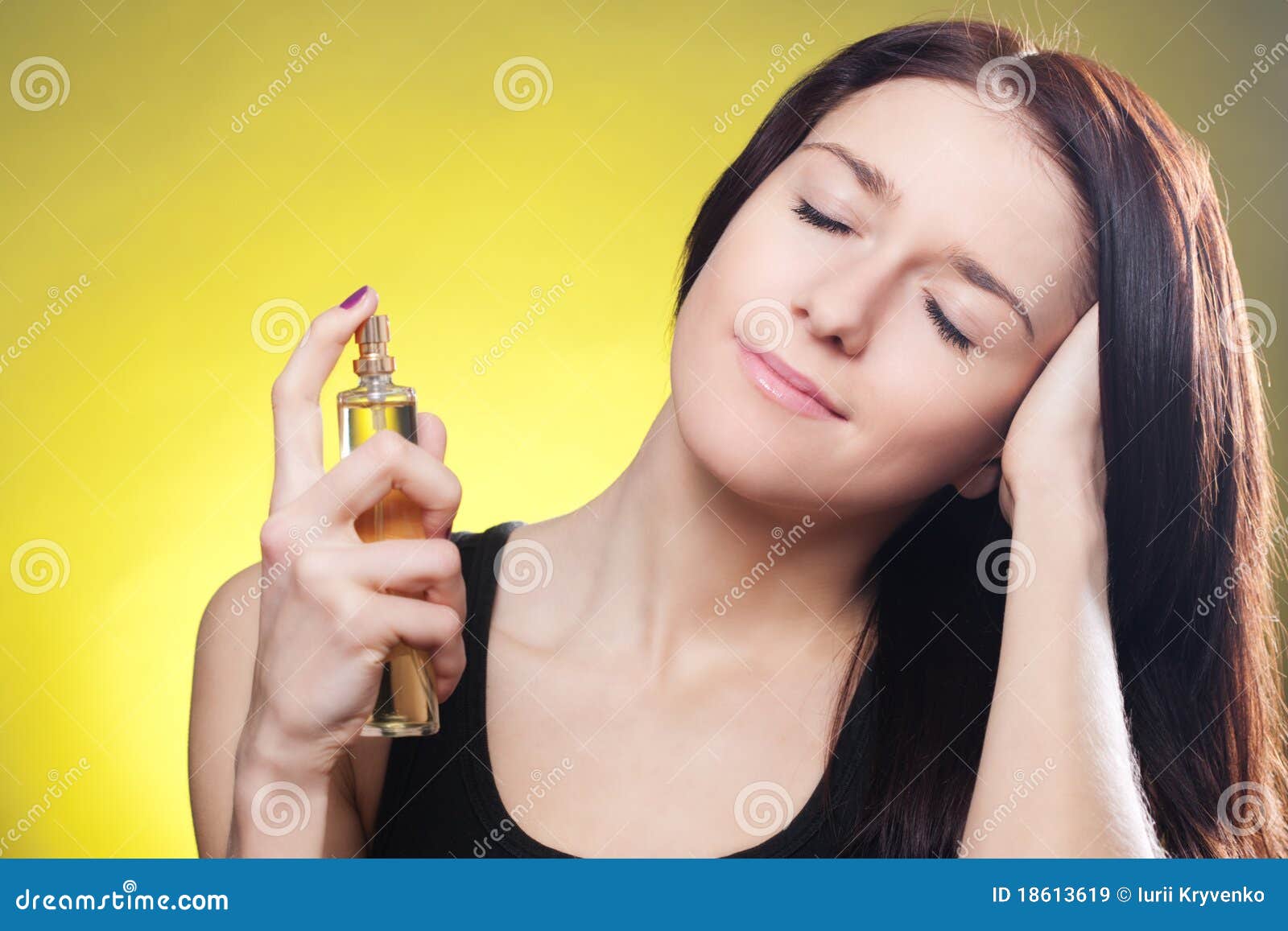 Woman applying perfume stock image. Image of eyes, beauty - 18613619