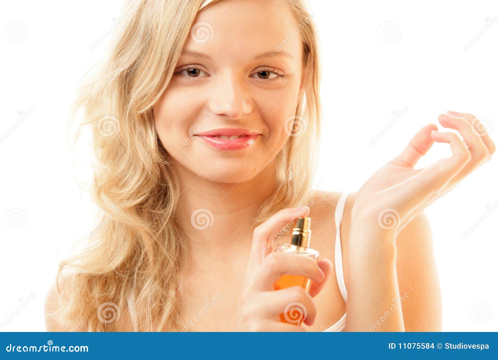 Woman Applying Perfume on Her Wrist Stock Photo - Image of face ...