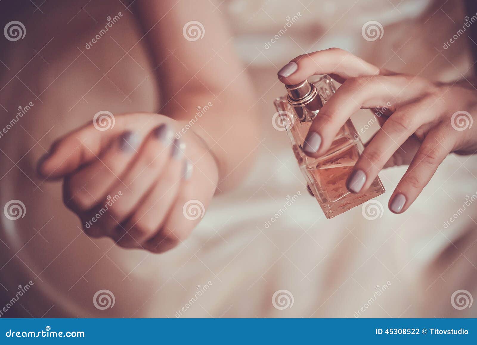 Woman Applying Perfume on Her Wrist Stock Photo - Image of beautiful ...