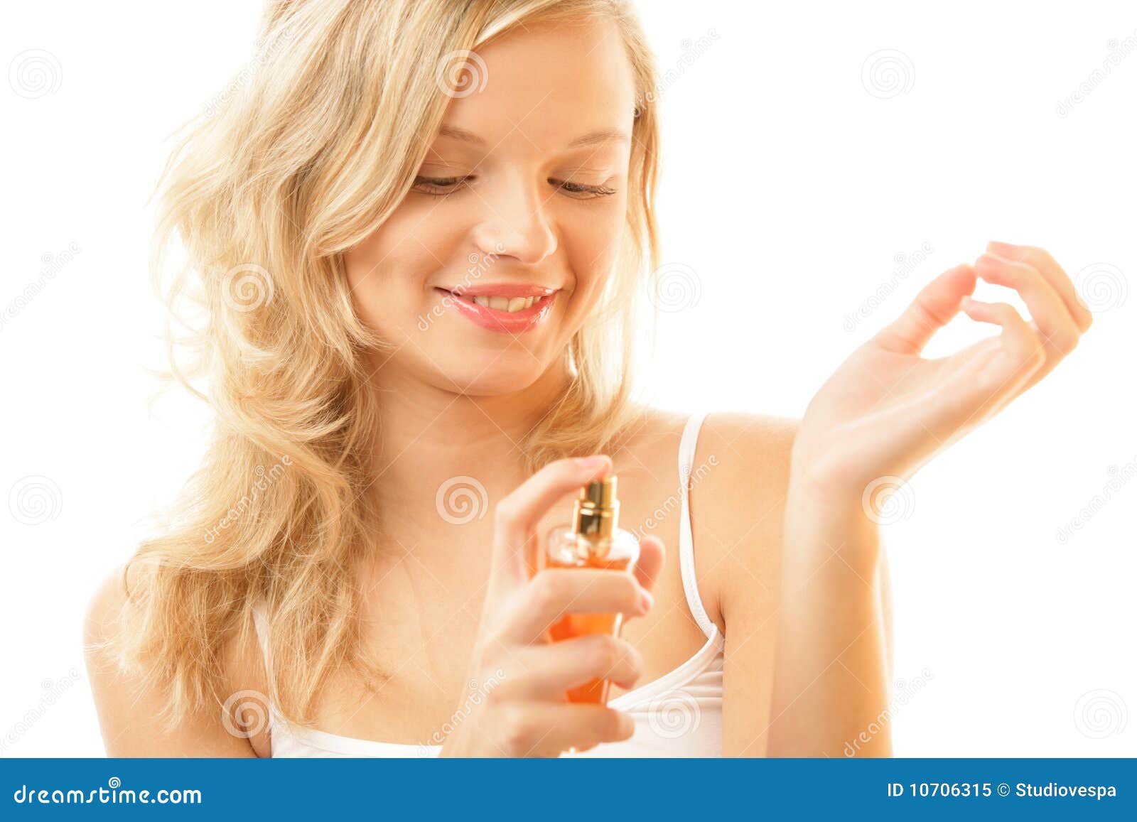 Woman Applying Perfume on Wrist Stock Image - Image of friendly, blond ...