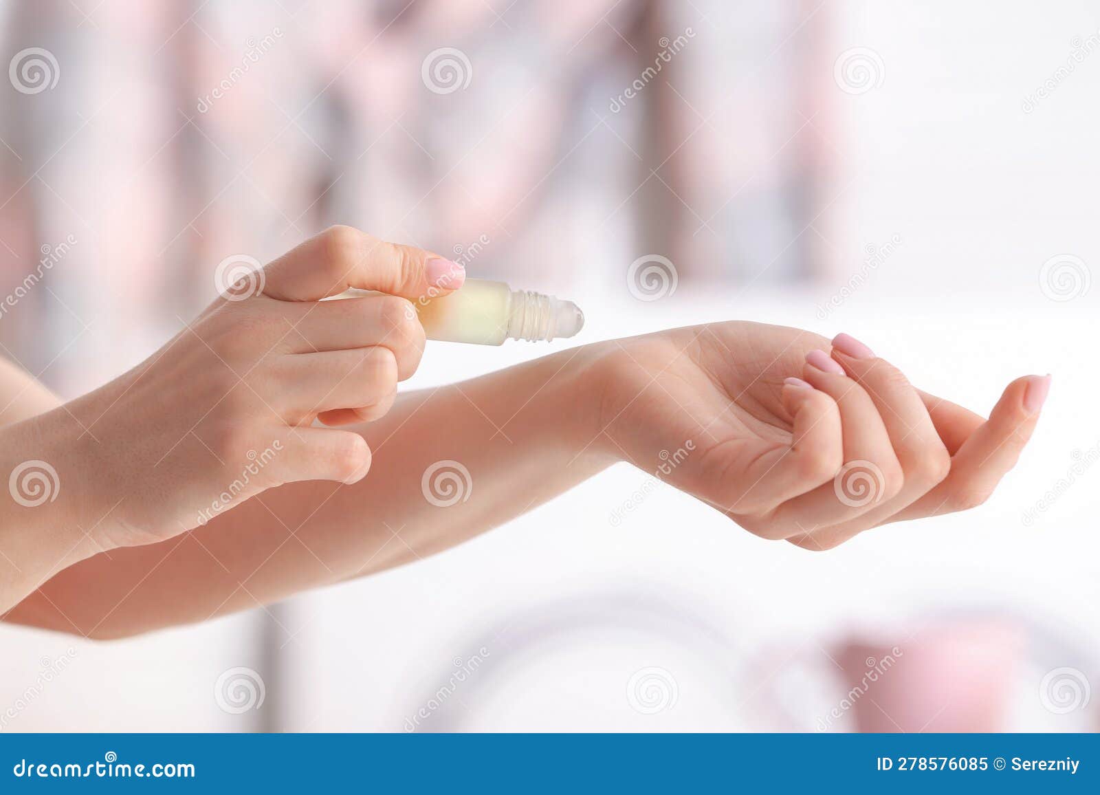 Woman Applying Roll-on Perfume at Home Stock Image - Image of beautiful ...