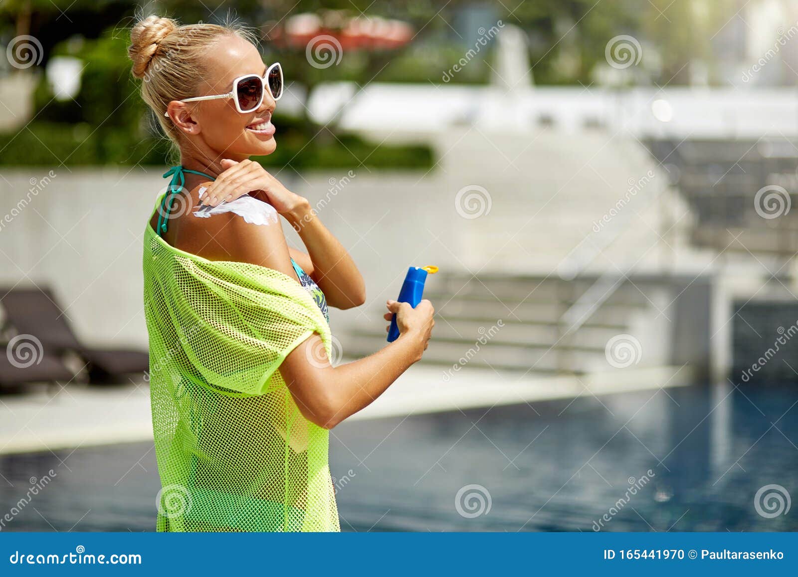 Woman Applying Sunblock Protection on Shoulders Stock Photo - Image of ...