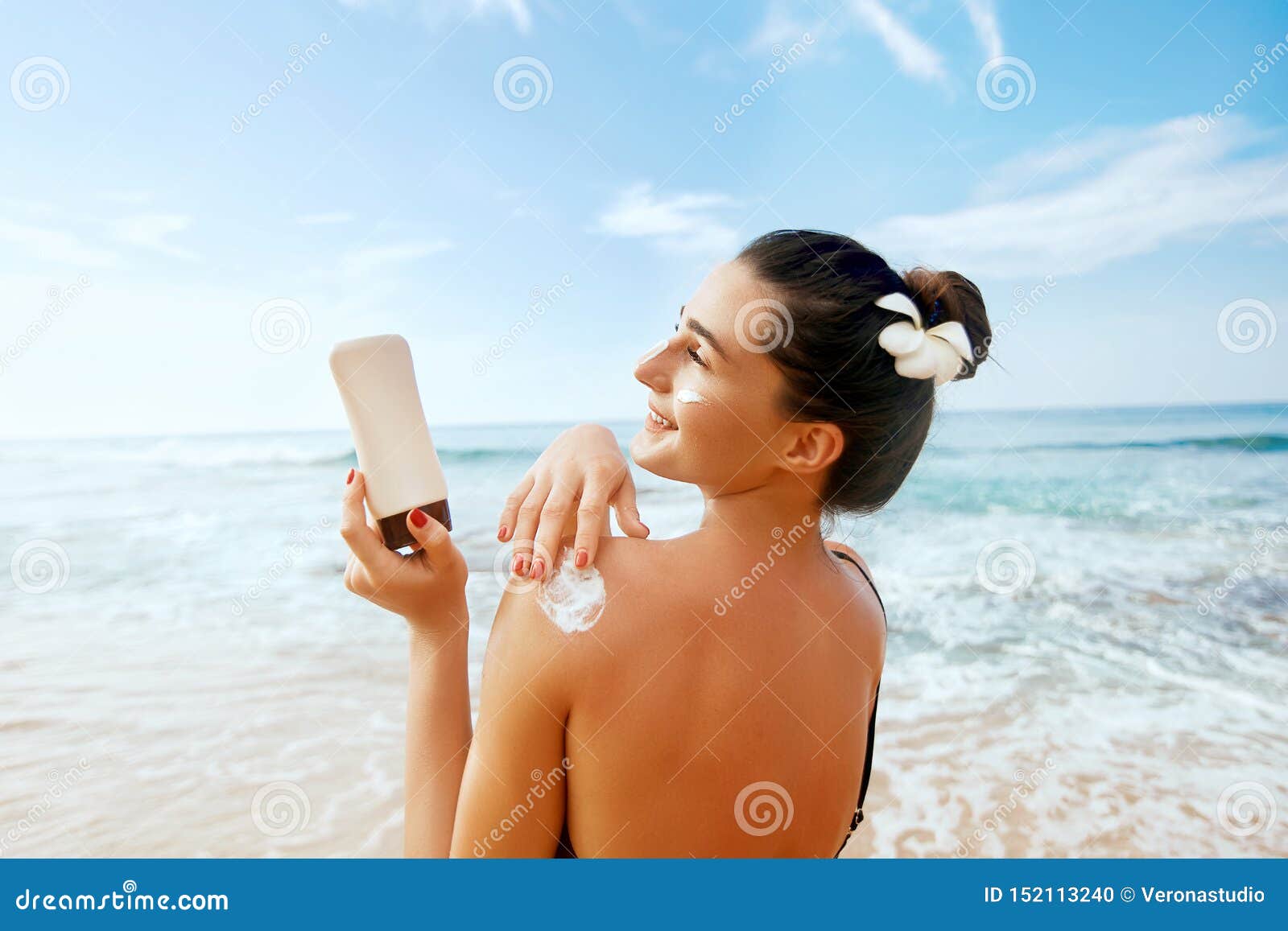 Woman Applying Sunscreen Creme On Tanned Shoulder Skincare Body Sun