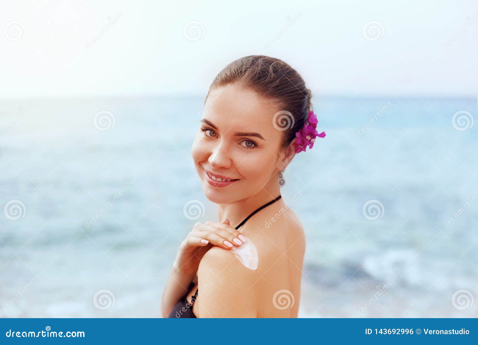 Woman Applying Sunscreen Creme On Tanned Shoulder Skincare Sun