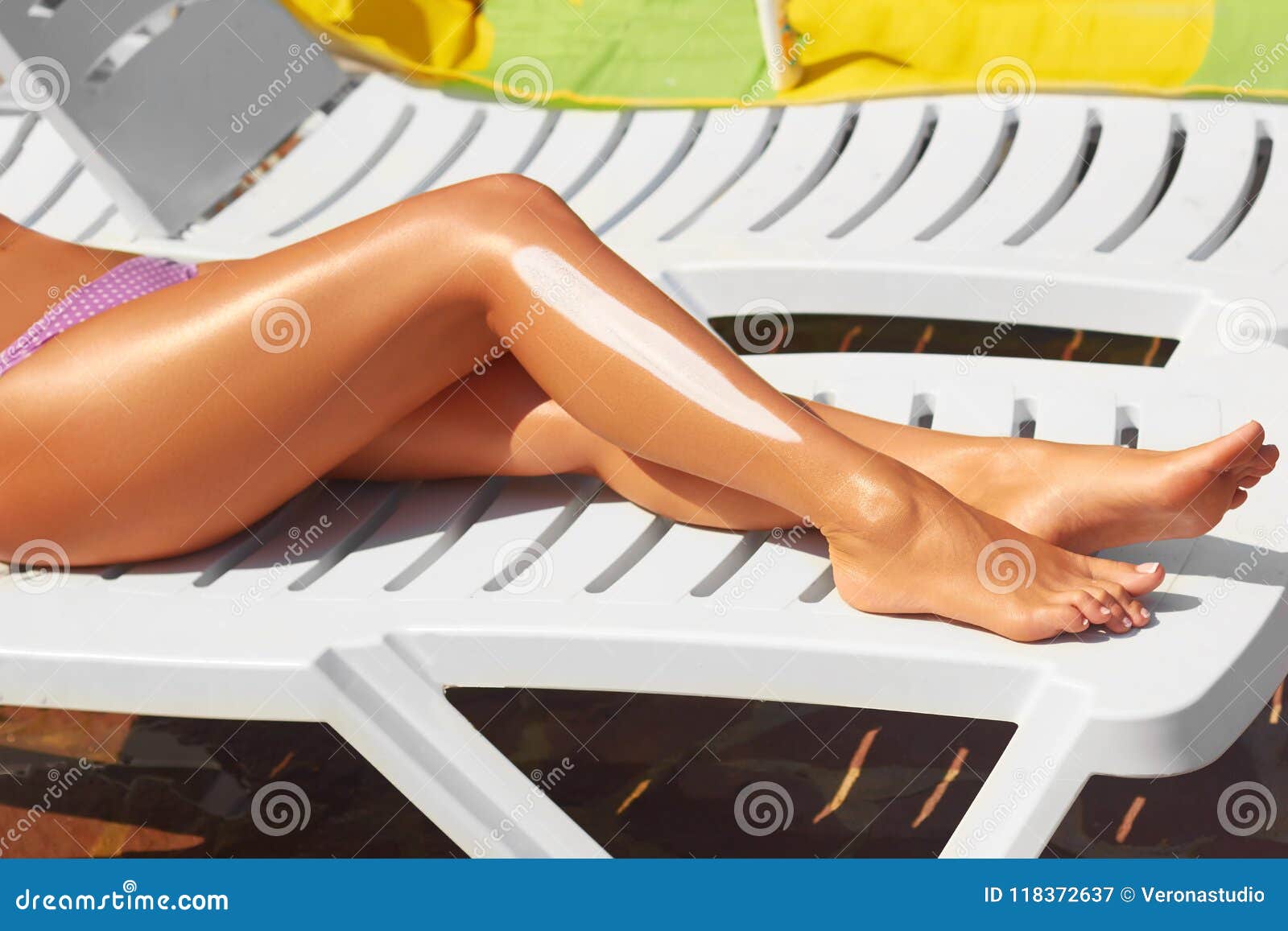 Woman Applying Sunscreen On Her Legs Stock Image Image Of Relaxation
