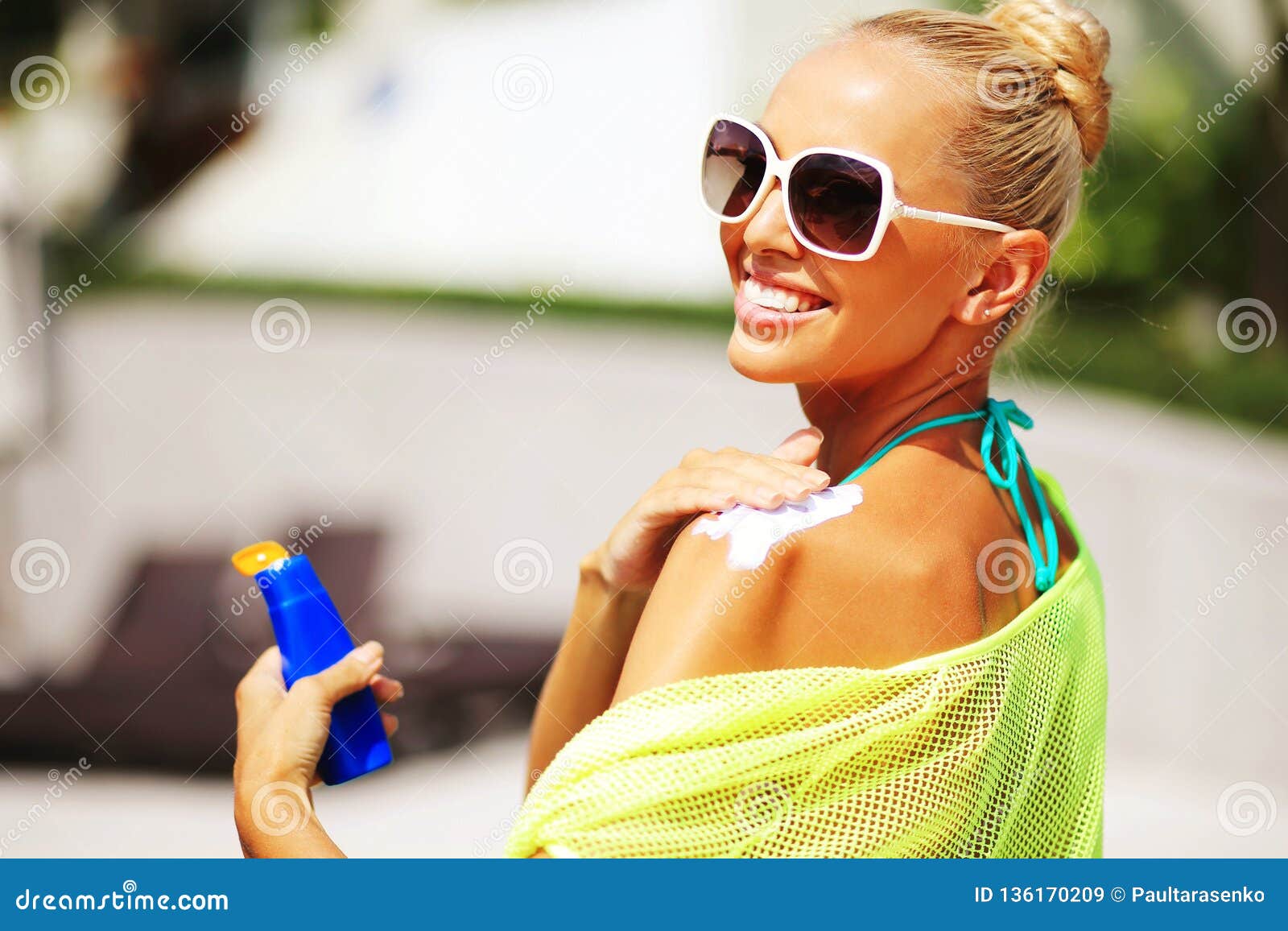 Woman Applying Sunscreen Protection On Her Shoulder Royalty-Free Stock ...