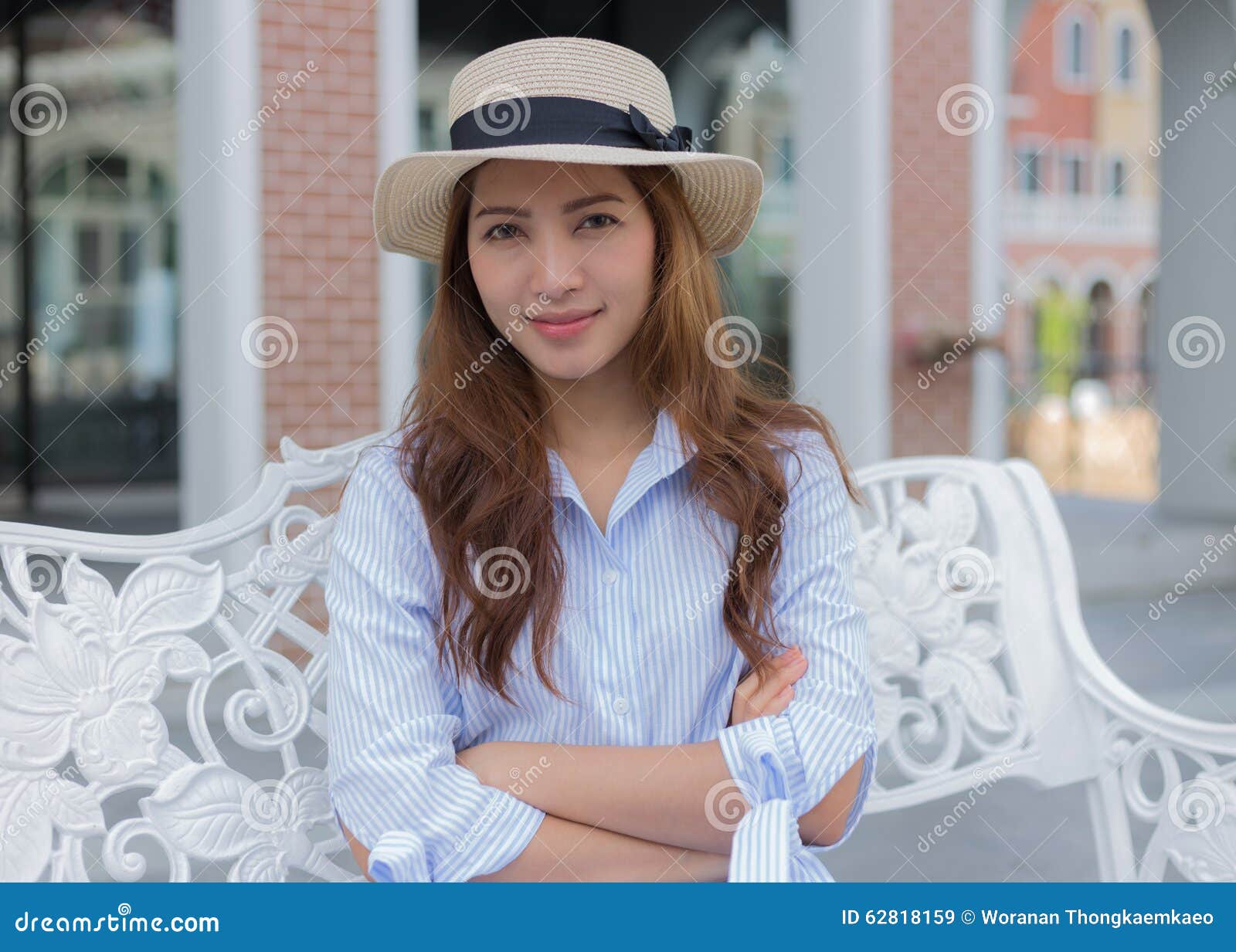 Woman with Arms Folded Sitting on Bench Stock Image - Image of clear ...