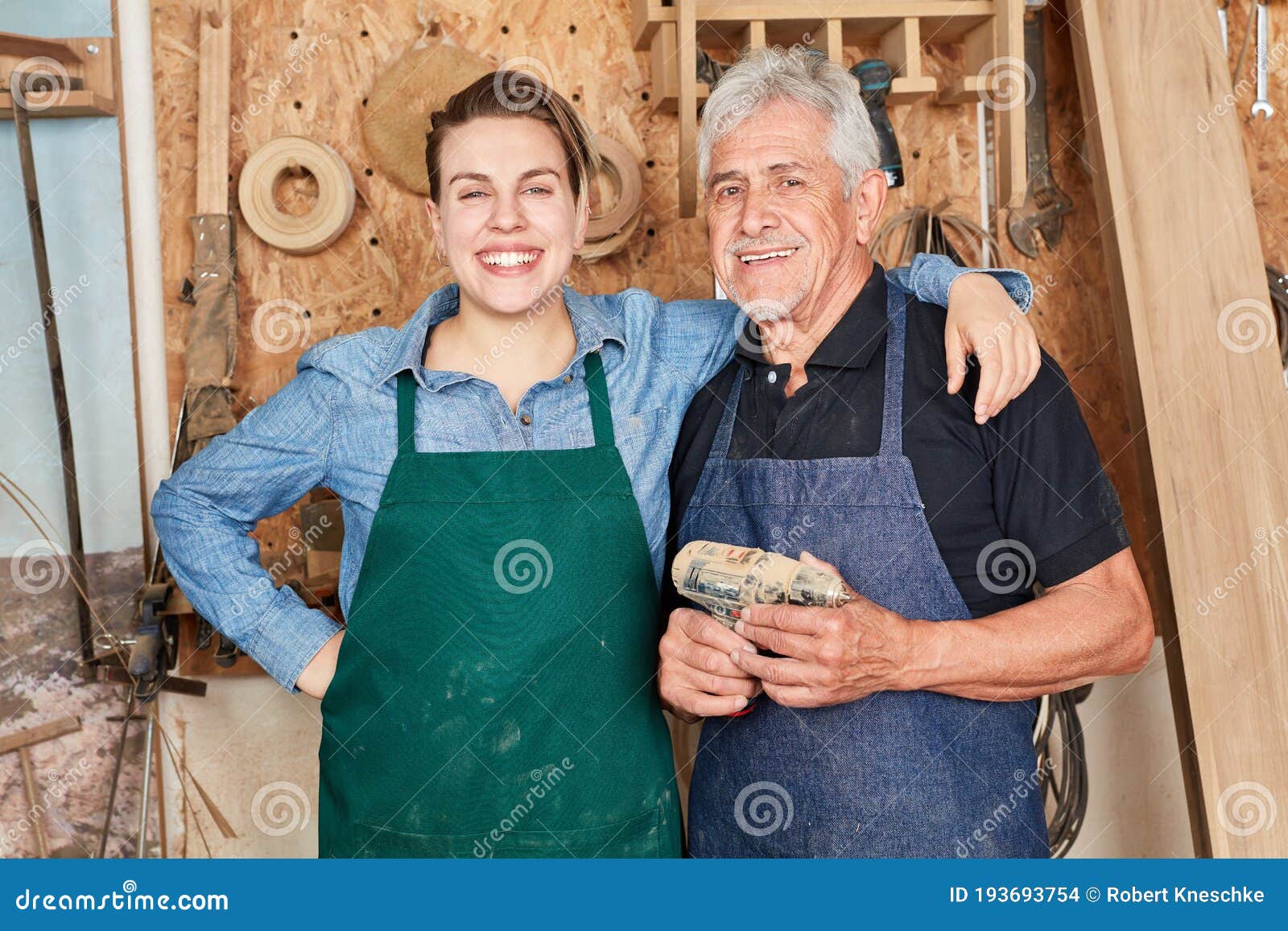 Woman As Apprentice and Apprentice with Joiner Master Stock Photo ...