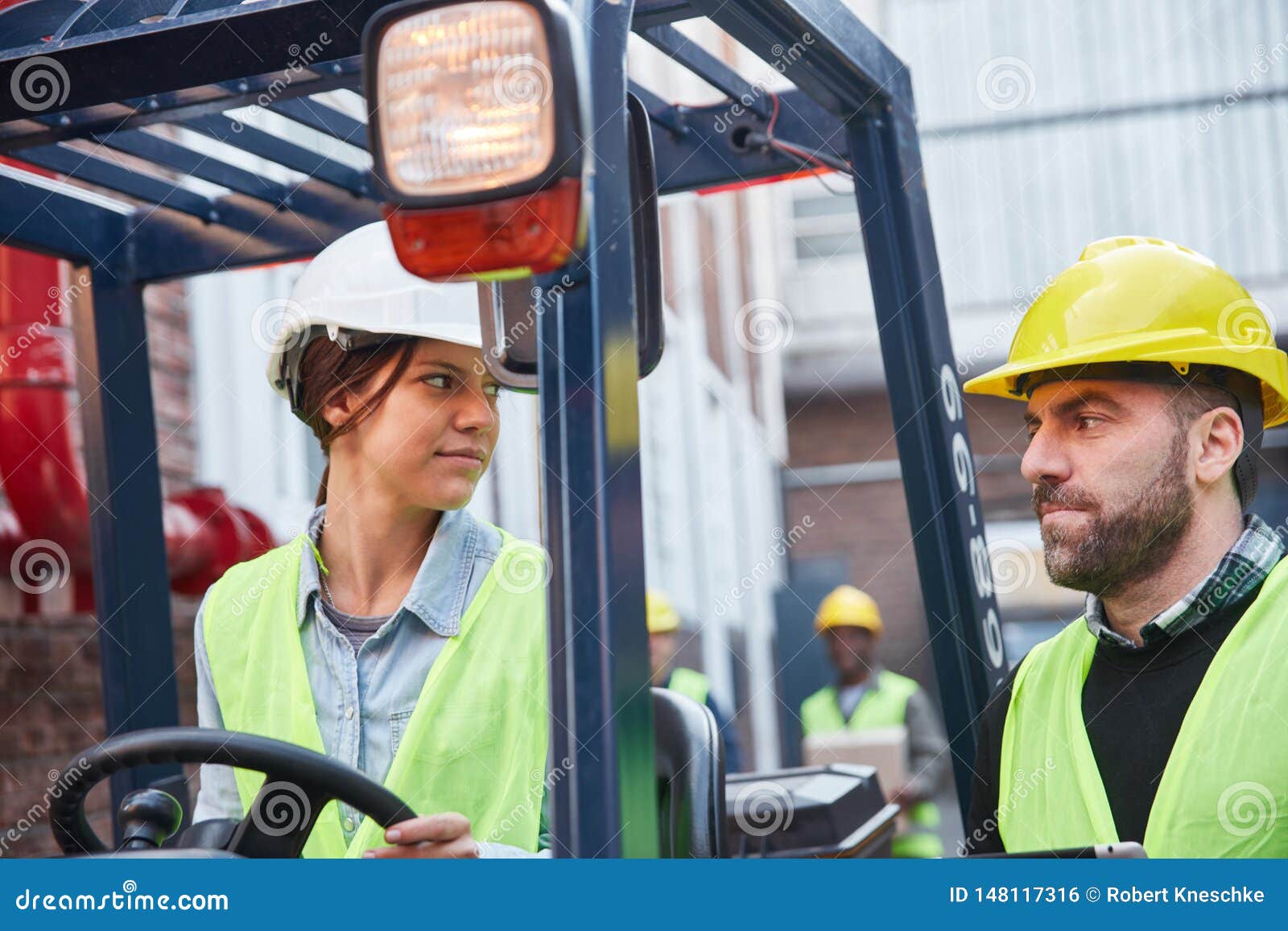 Woman As Forklift Driver and Colleague in Freight Forwarding Stock ...