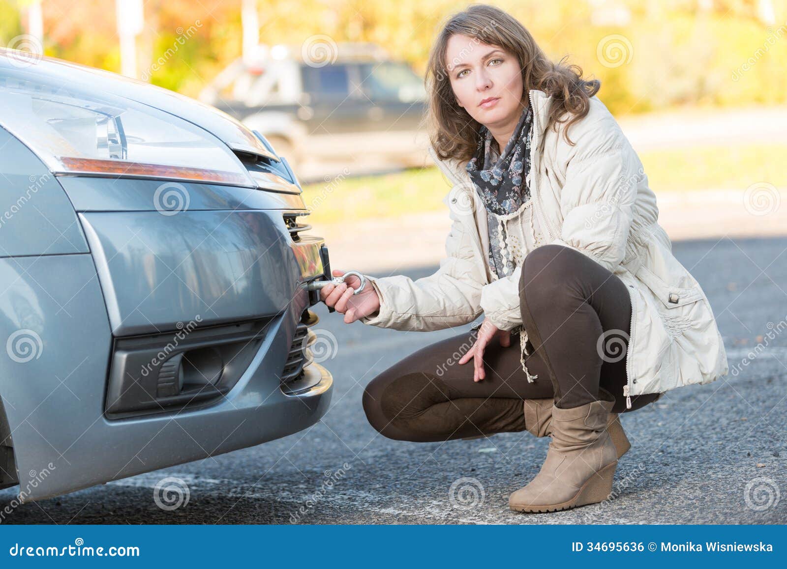 Woman Assembling Towing Hook Stock Photo - Image of motoring, person ...