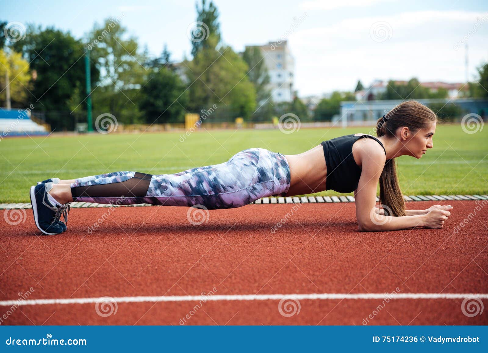 Woman Athlete Doing Plank Exercise on Stadium Stock Photo - Image of ...