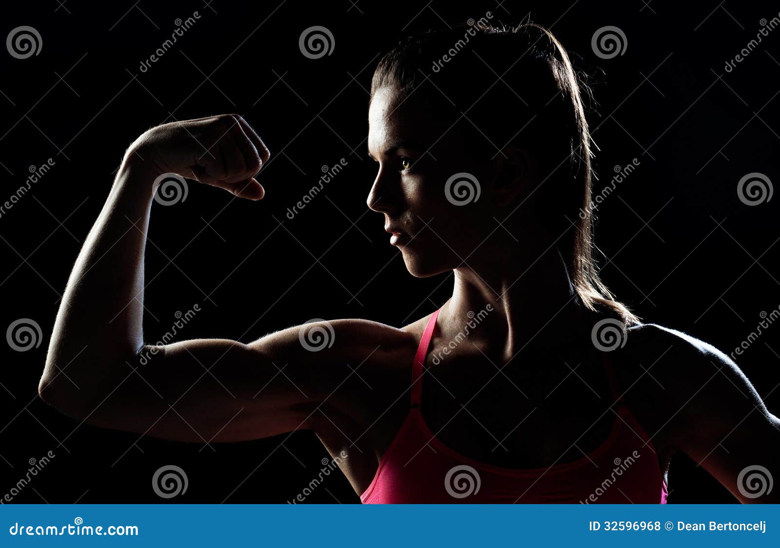 Woman Athlete Showing Biceps Stock Photo - Image of building, exercise ...
