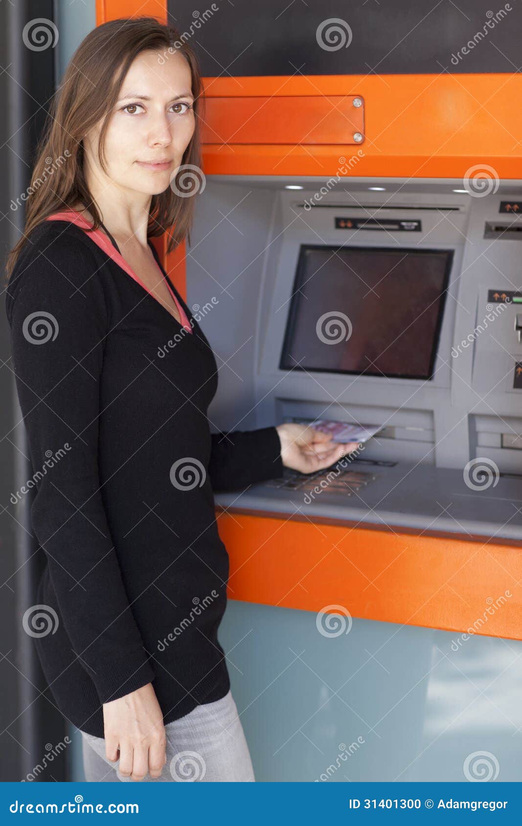 Woman at the ATM stock photo. Image of financier, secret - 31401300