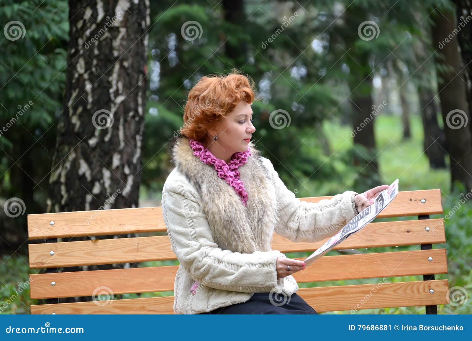 The Woman of Average Years Looks for Work on the Newspaper Stock Image ...