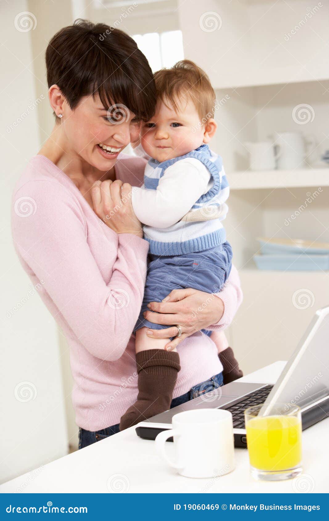 Woman with Baby Working from Home Stock Image - Image of office ...