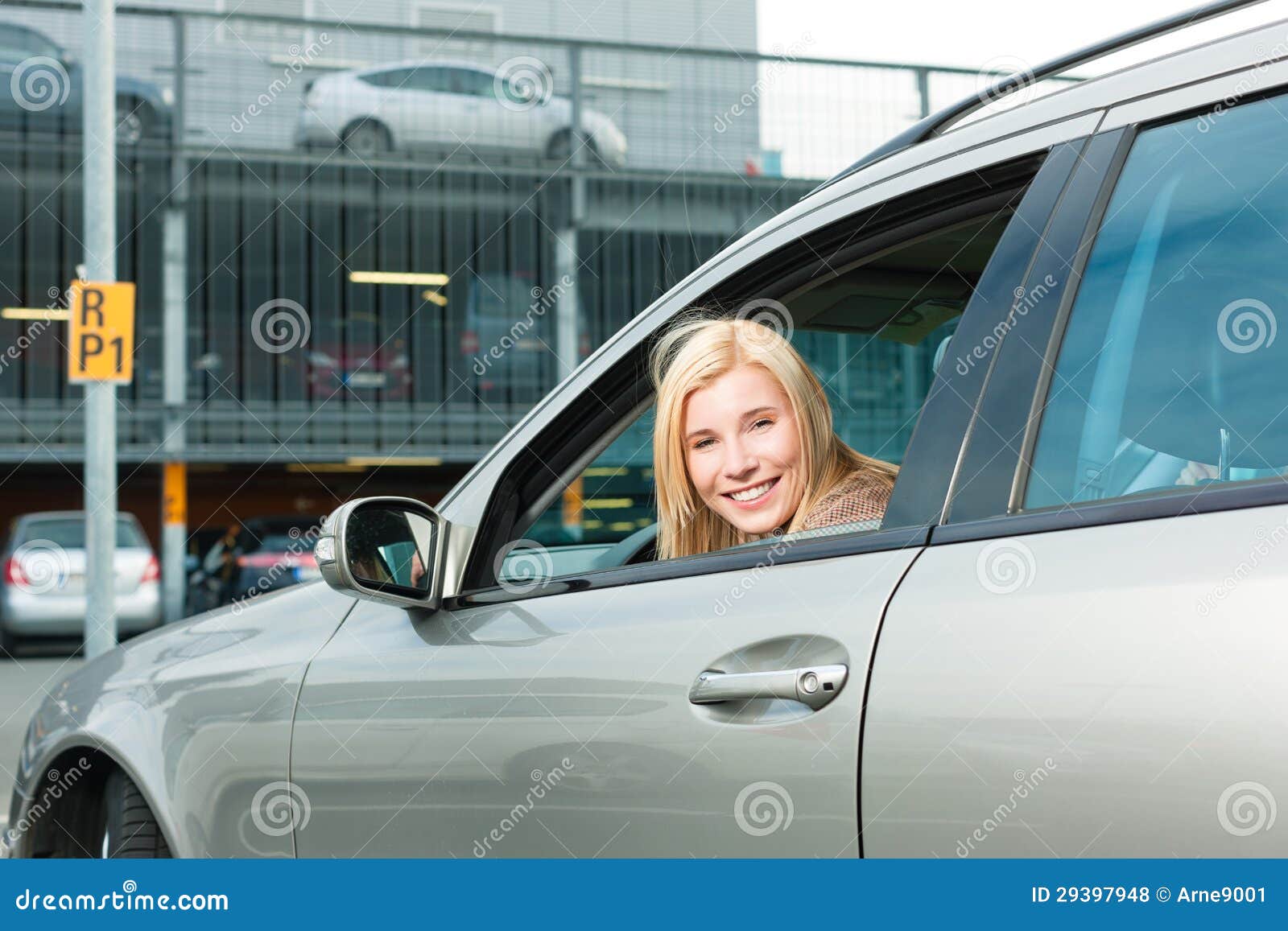 Woman Back Her Car on a Parking Level Stock Photo - Image of carefree ...