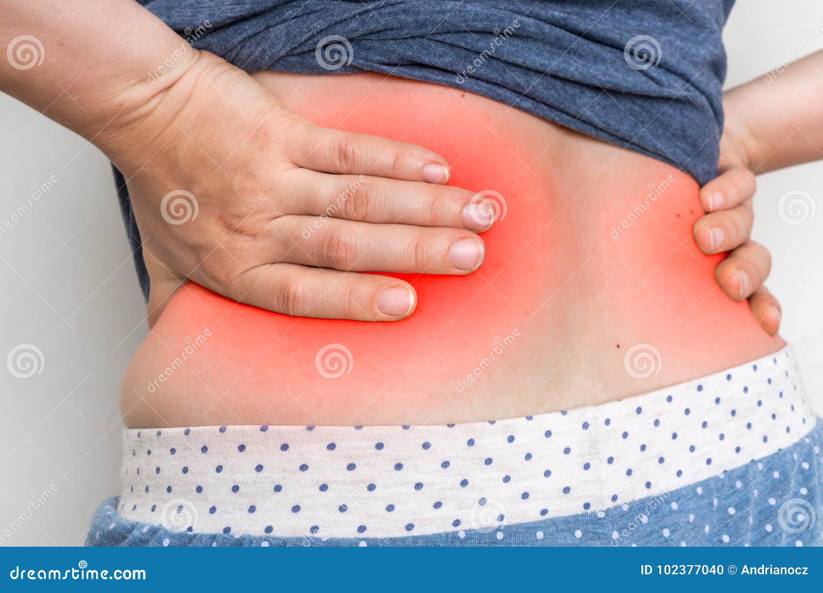 Woman with Back Pain Touching Her Aching Back Stock Photo - Image of ...