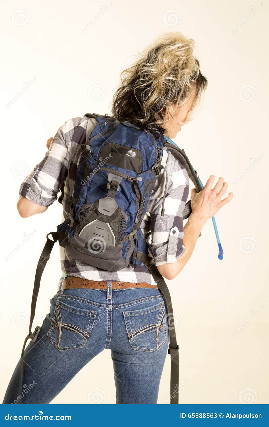 Woman with Backpack on from the Back Look To Side Stock Image - Image ...