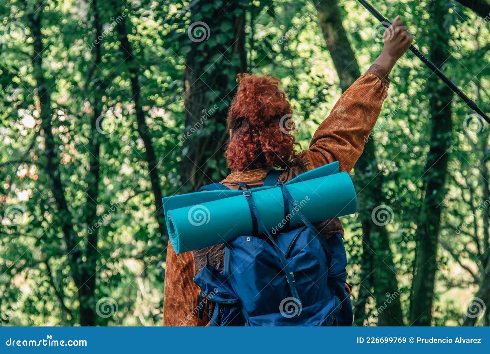 Woman with backpack stock image. Image of female, gesturing - 226699769