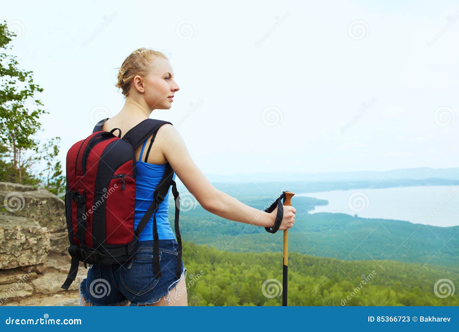 Woman with Backpack Hiking in the Mountains Stock Image - Image of ...