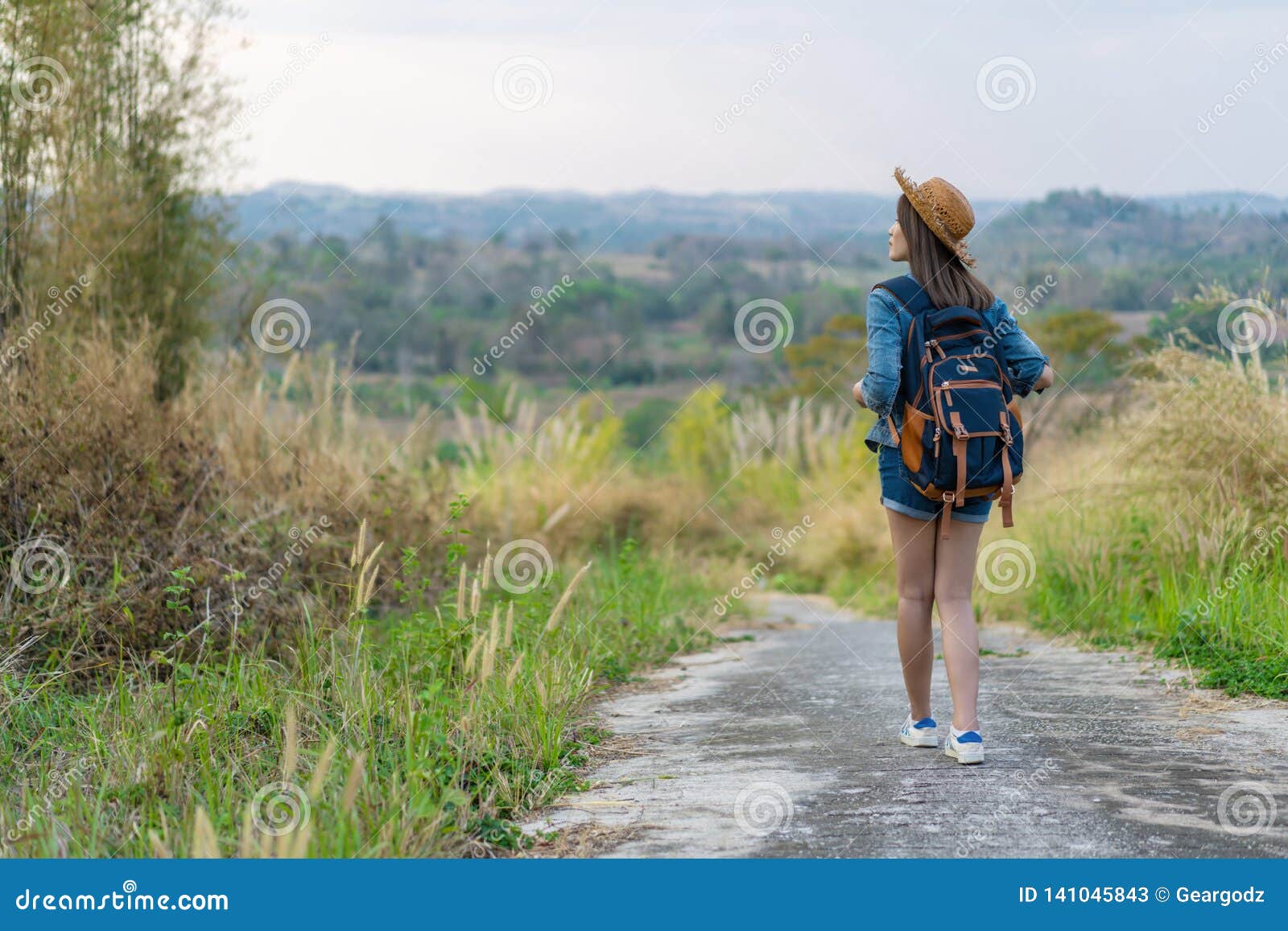 Woman with Backpack Walking on Footpath in Nature Stock Image - Image ...