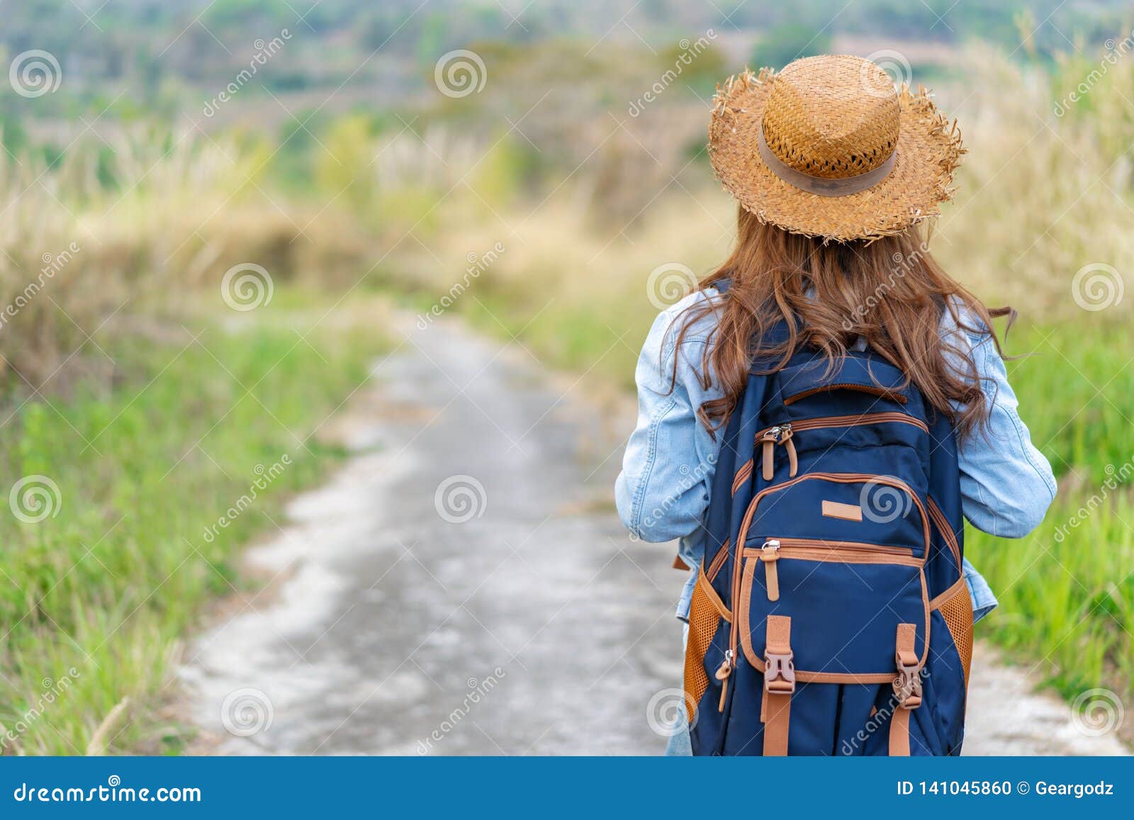 Woman with Backpack Walking on Footpath in Nature Stock Photo - Image ...