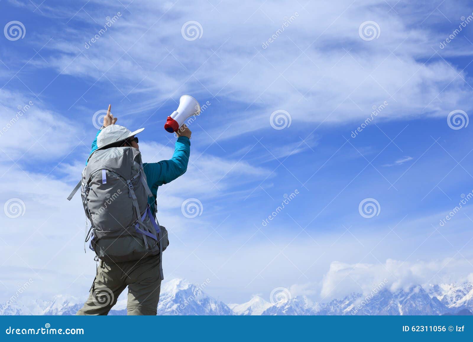 Woman Backpacker Shouting with Loudspeaker on Beautiful Mountain Peak ...