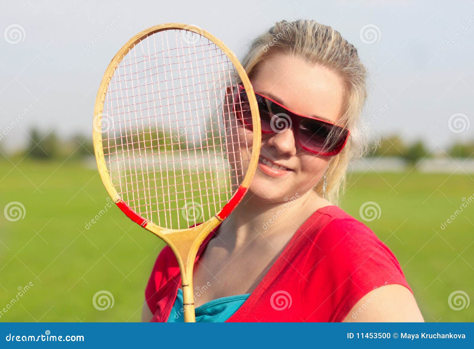 Woman with Badminton Racquet Stock Photo - Image of lovely, lady: 11453500