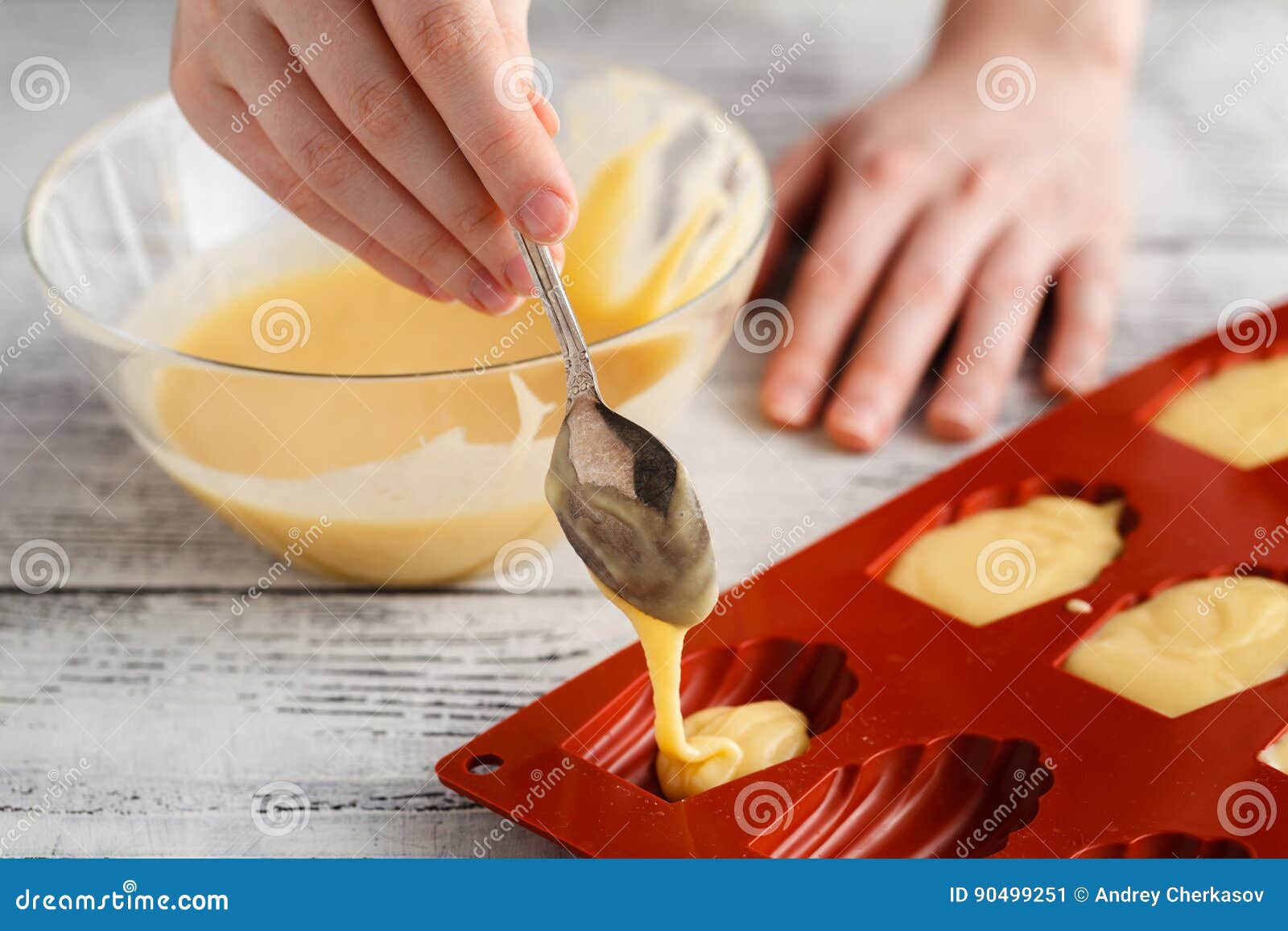 Woman Baker is Pouring Dough into a Baking Tray. Stock Image - Image of ...
