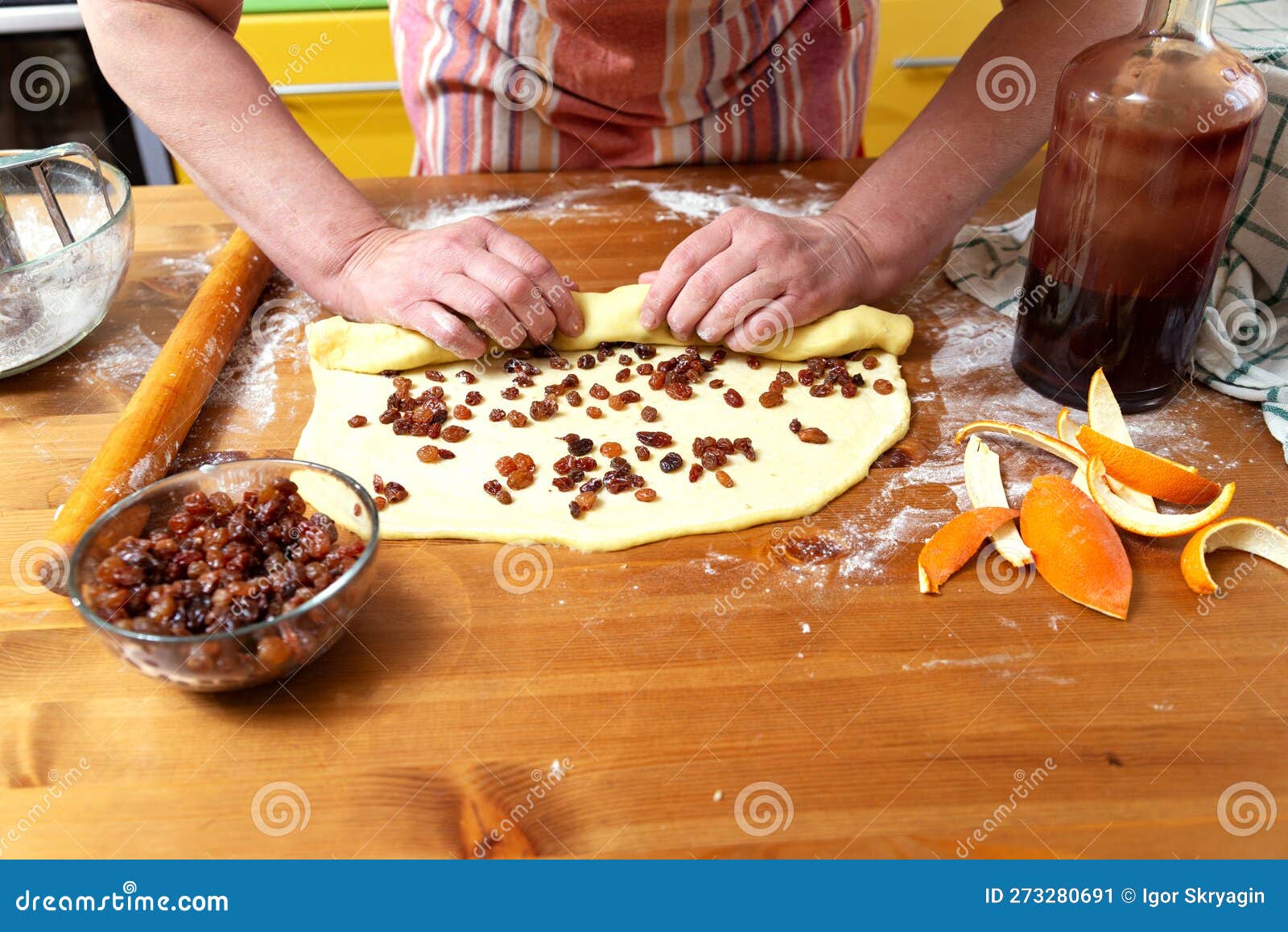 Woman Baker Rolls Raisins into Pastry for Making Buns Stock Image ...