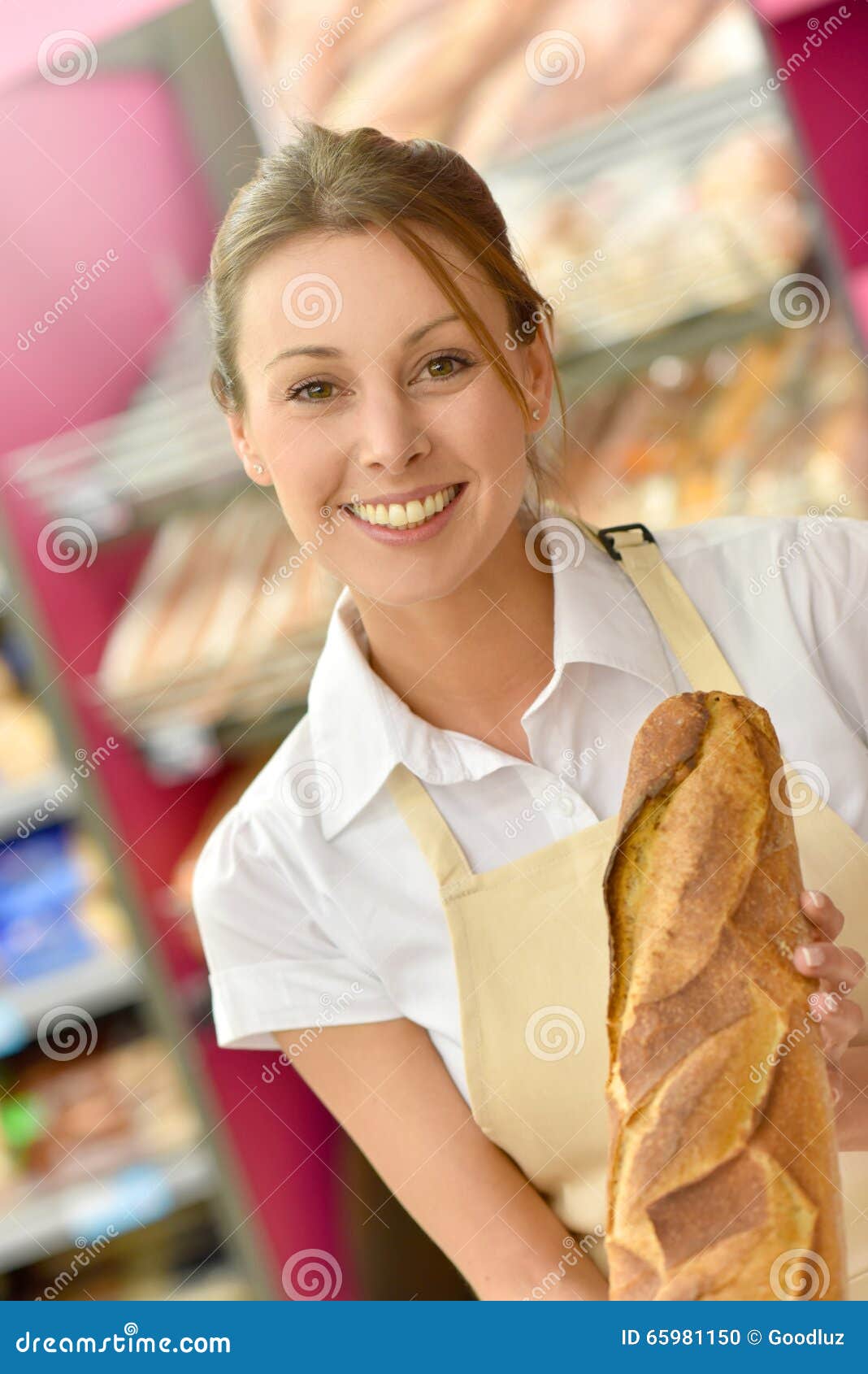 Woman baker selling bread stock photo. Image of food - 65981150
