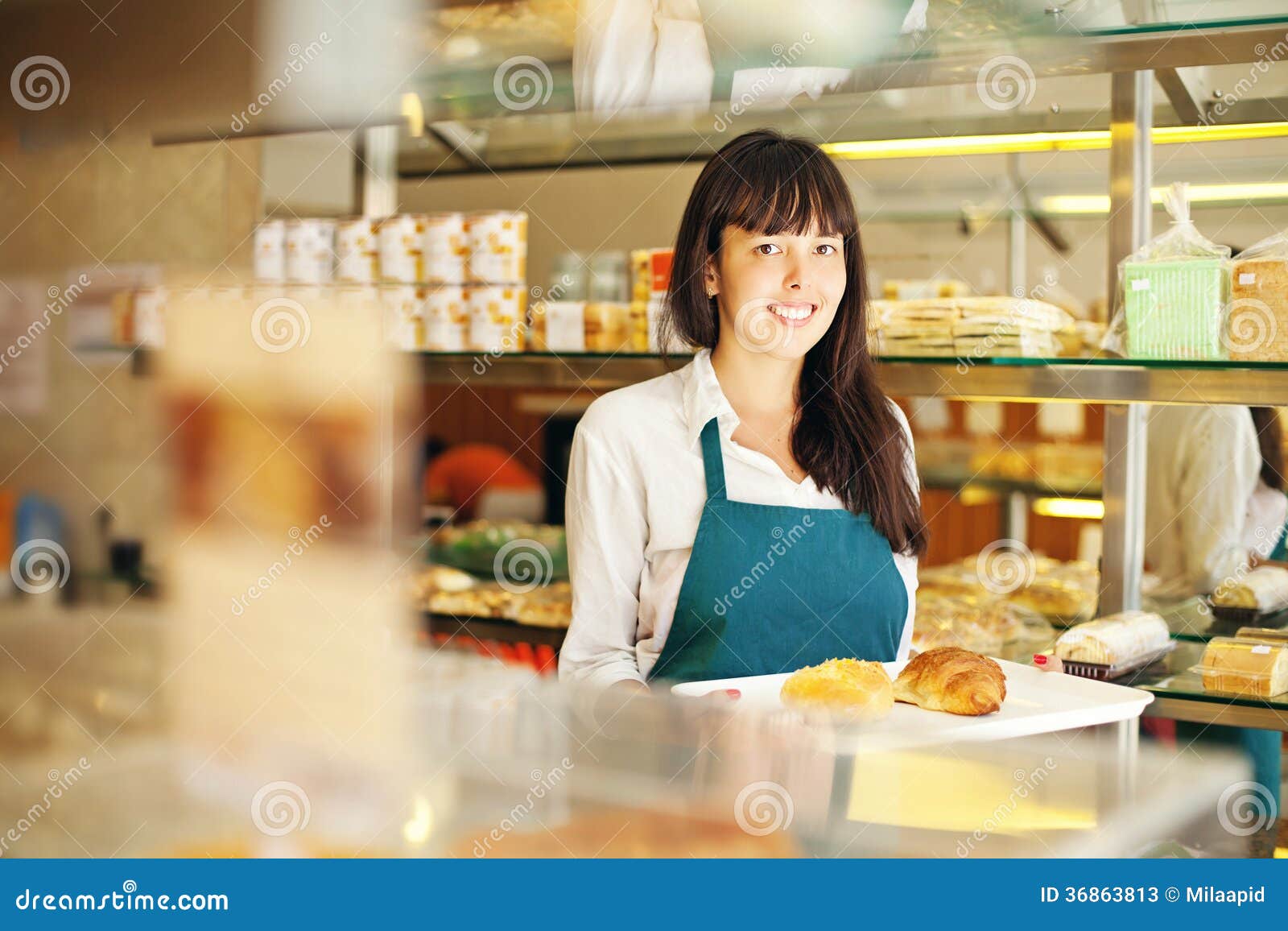 Woman in bakery stock image. Image of employee, oven - 36863813