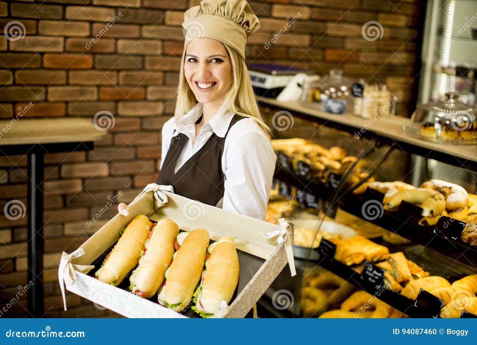 Woman in bakery stock photo. Image of shop, freshness - 94087460