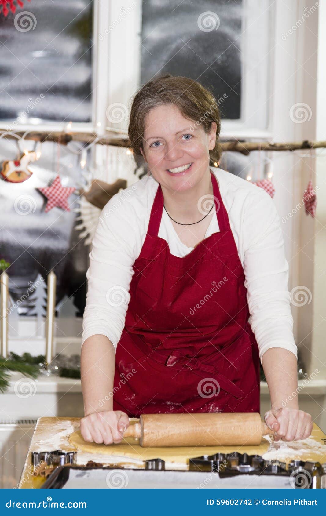 Woman is baking cookie stock photo. Image of preparing - 59602742
