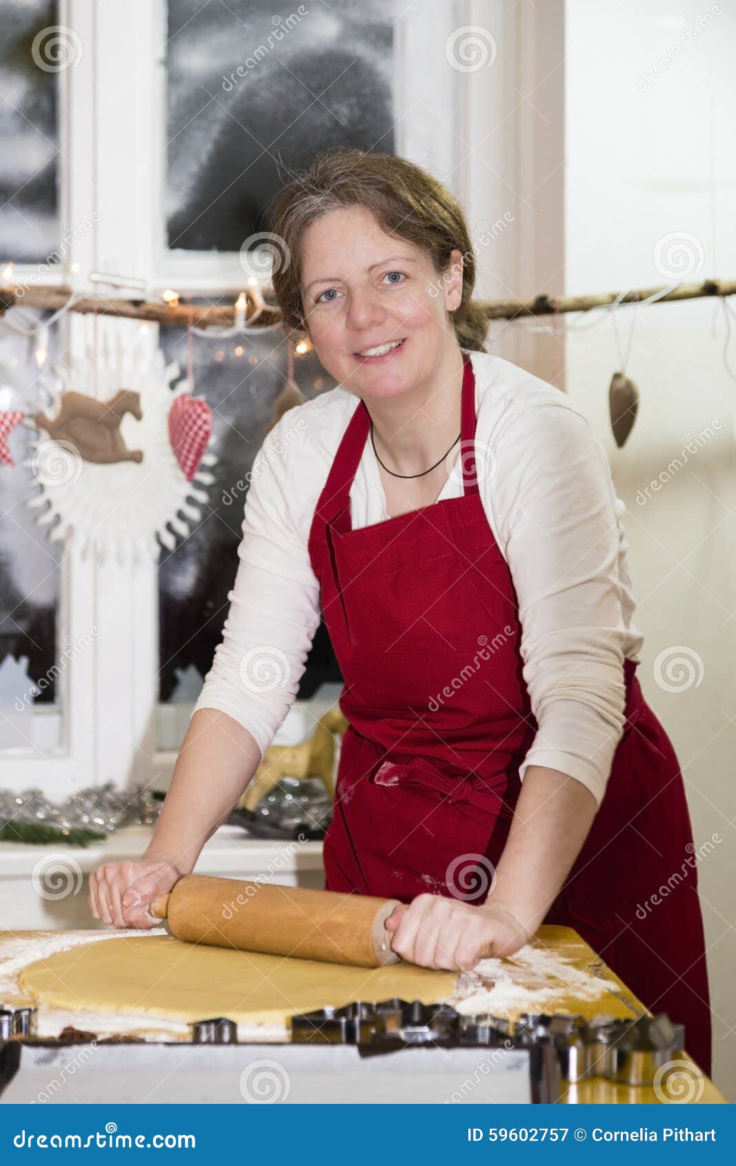 Woman is baking cookie stock image. Image of cutter, female - 59602757